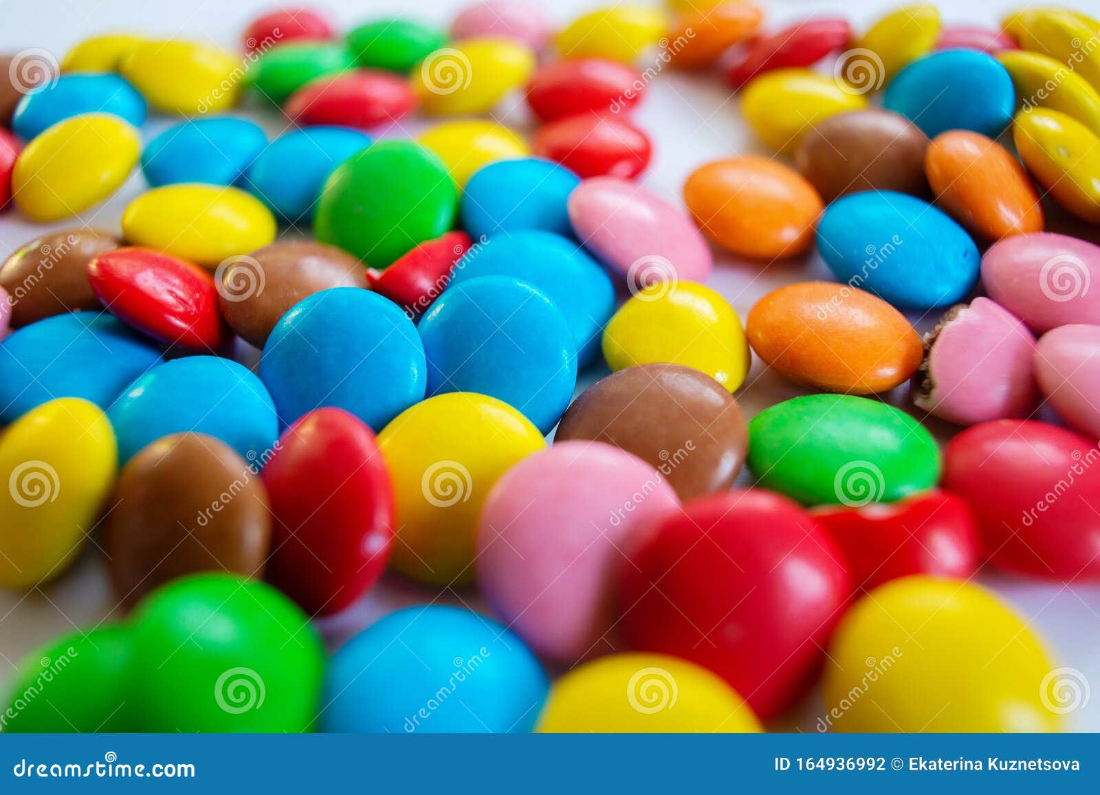 Many Multi-colored Small Round Sweets are Scattered on the Table Stock ...