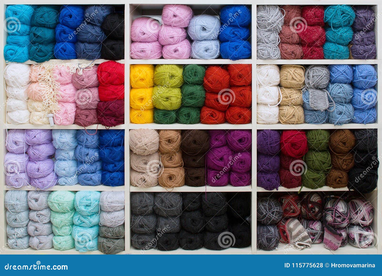 Many Multi-colored Threads for Knitting in Cells. Stock Photo - Image ...