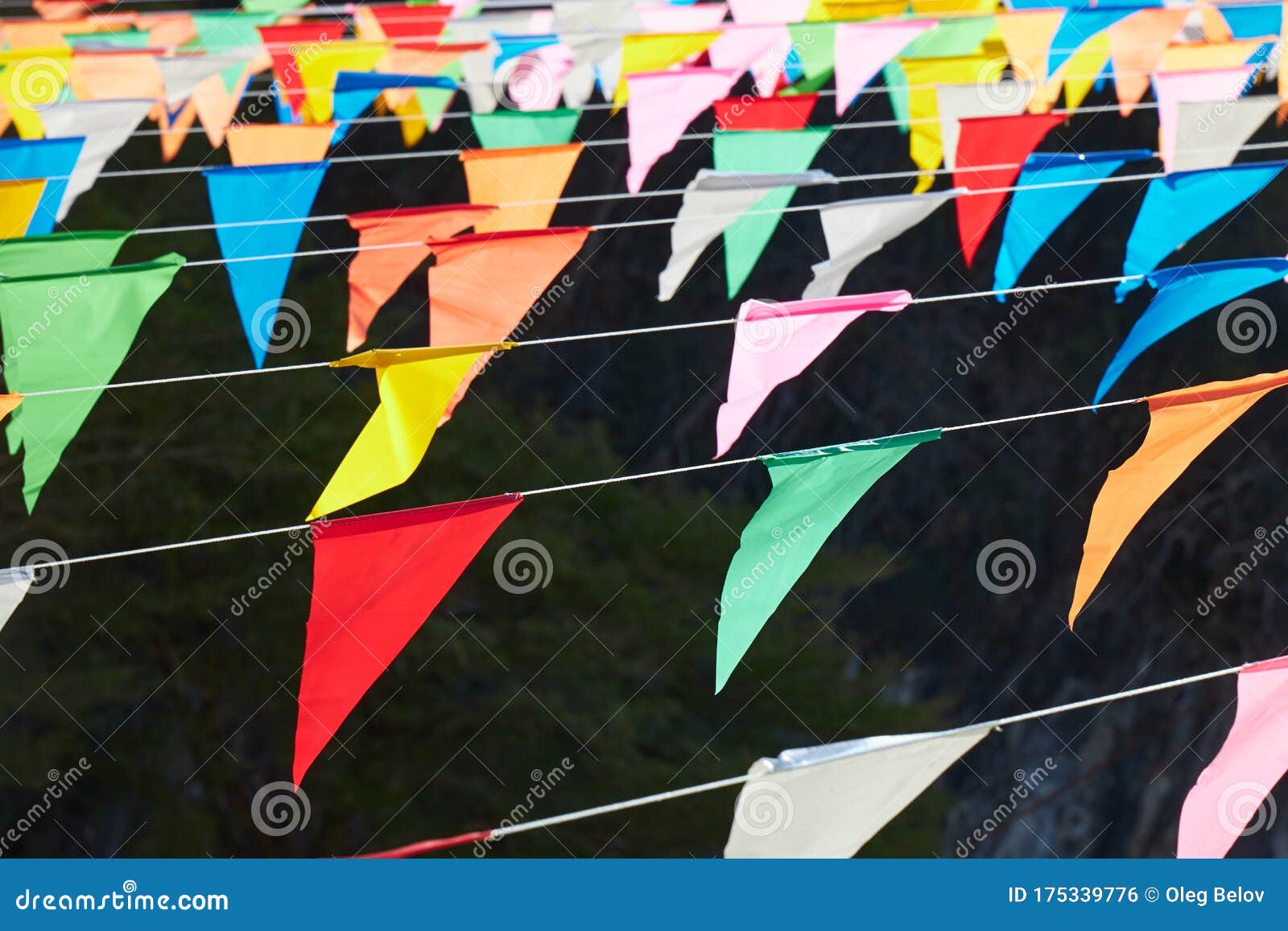 Many Multi Colored Triangular Flags Hanging on the Ropes As a Holiday ...