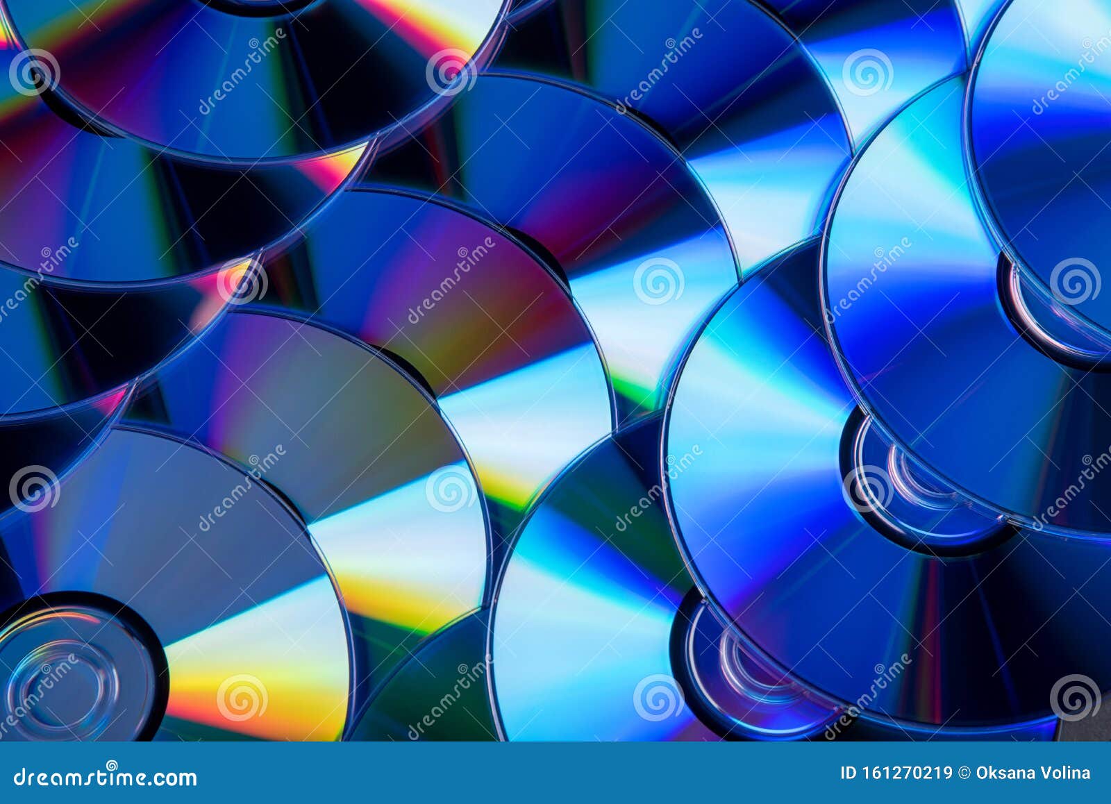 Many Musical Compact Discs with a Rainbow Spectrum of Colors As a ...