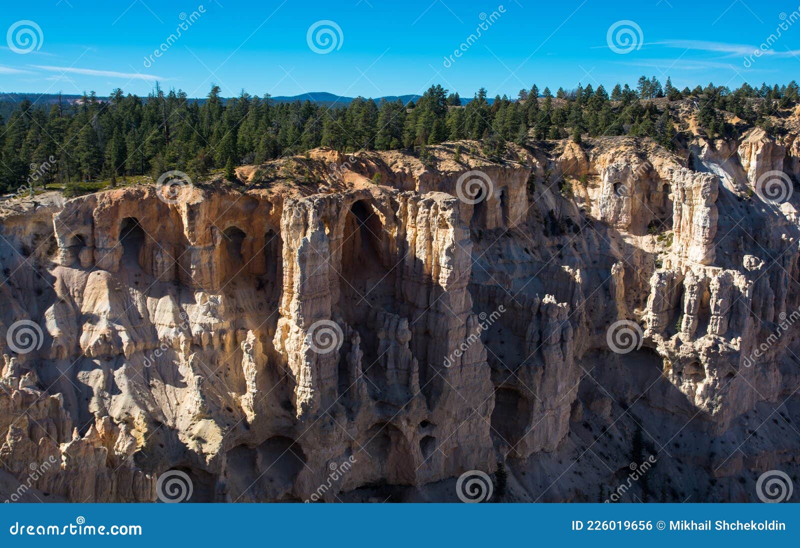 Many Natural Caves in the Cliff Stock Photo - Image of nature, rocks ...