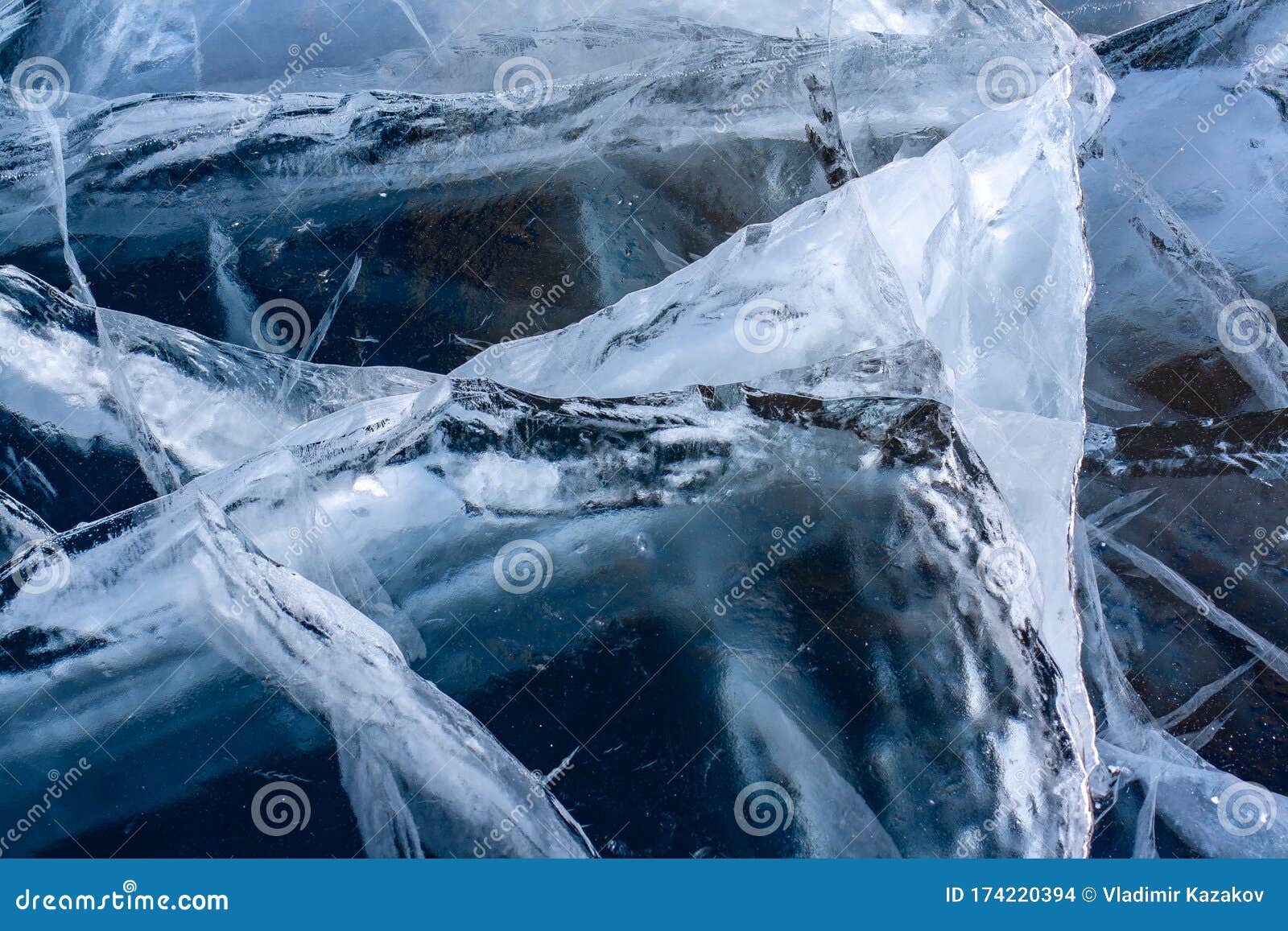 Many Natural Deep Cracks in the Ice of Lake Baikal. Stock Photo - Image ...