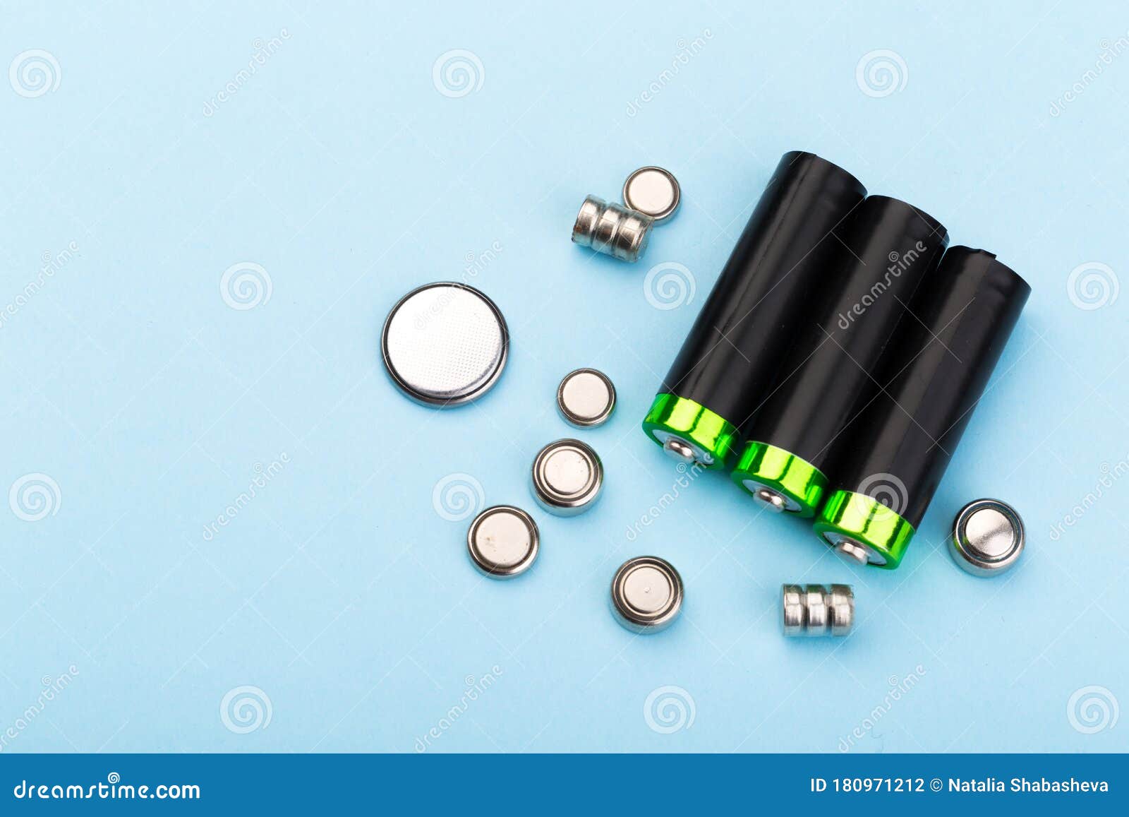 Many New and Used Batteries of Different Shapes, AA, Round Batteries on ...