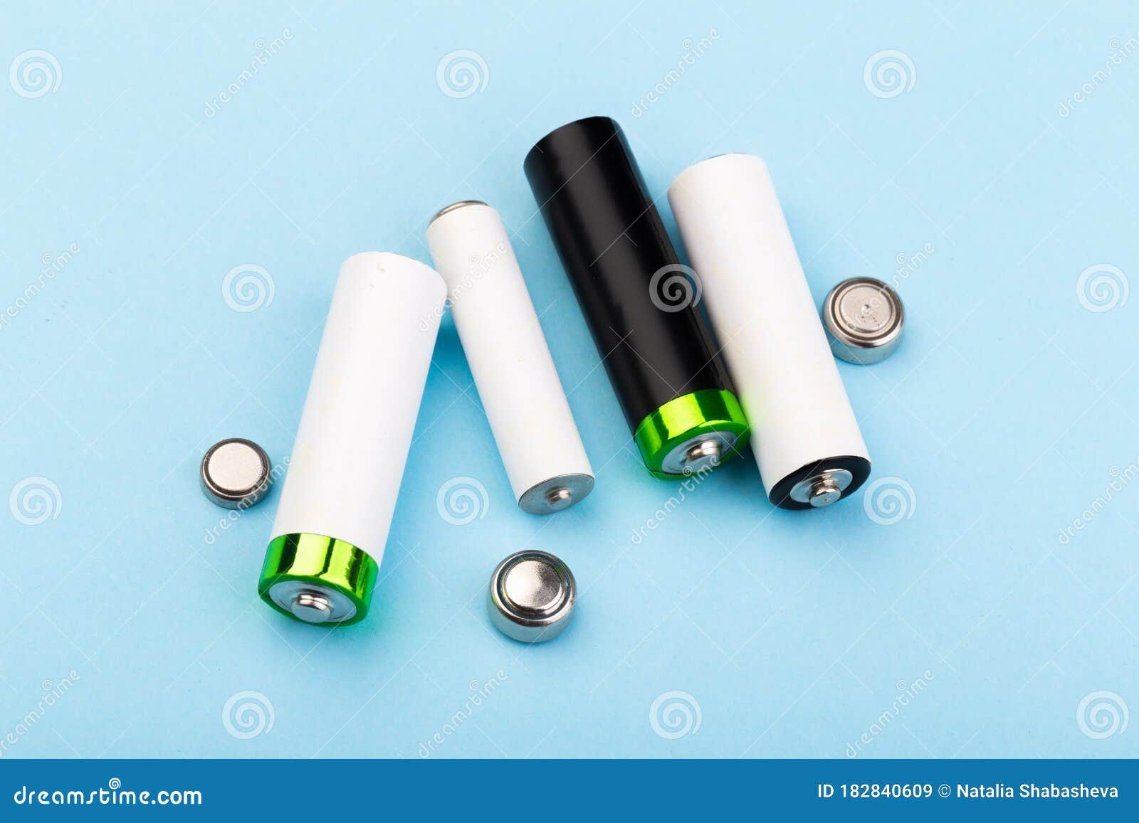 Many New And Used Batteries Of Different Shapes, AA, Round Batteries On ...