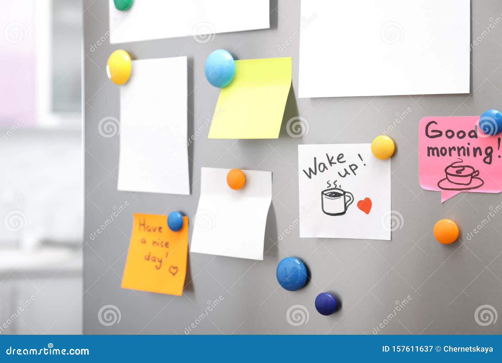 Many Notes and Empty Sheets with Magnets on Refrigerator Door in ...