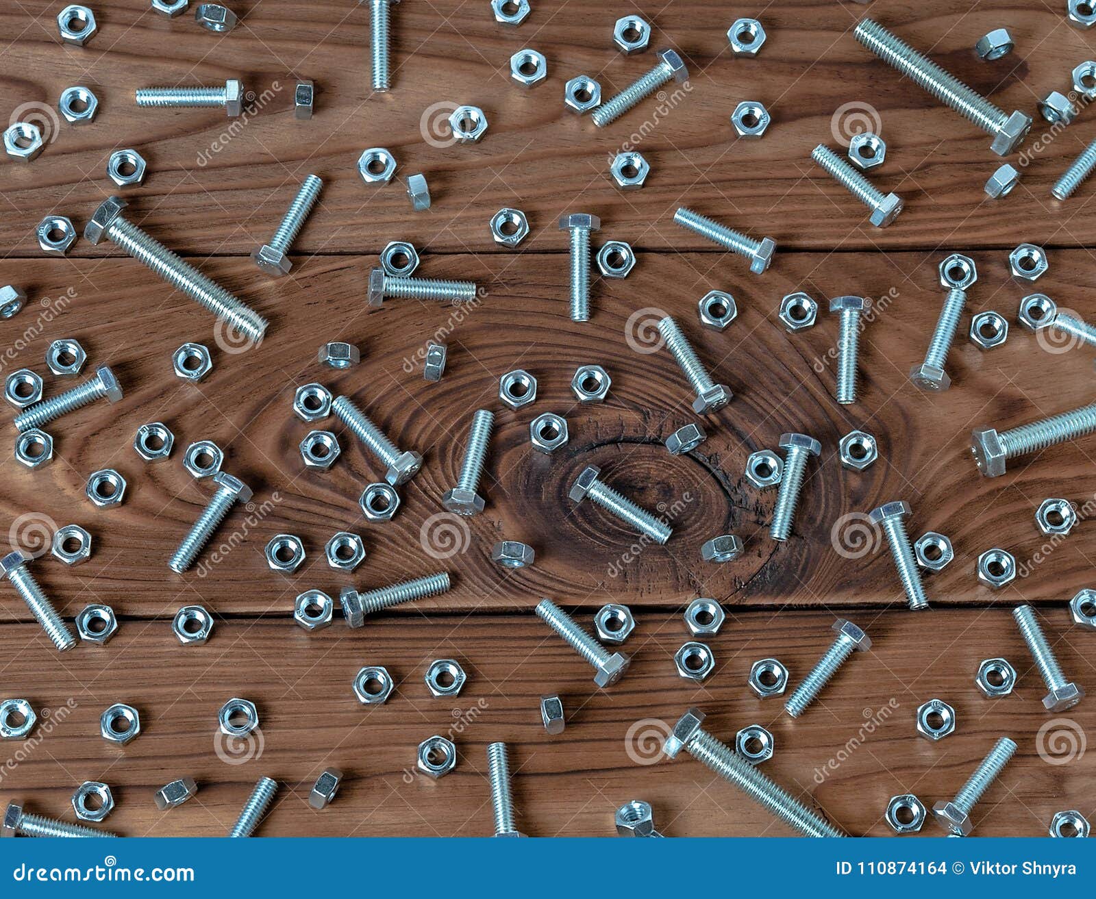 Many Nuts and Bolts on a Wooden Surface Stock Photo - Image of ...