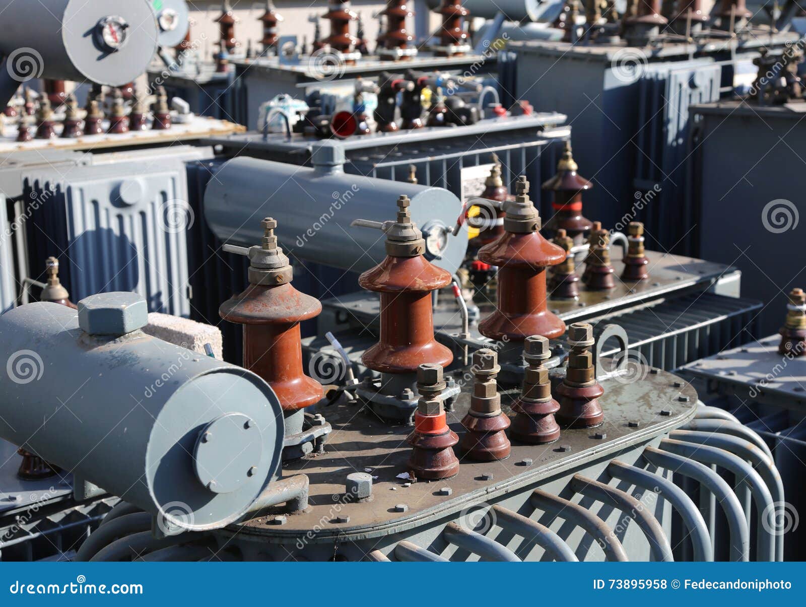 Many Old Large Electric Voltage Transformers in the Dump of the Stock ...