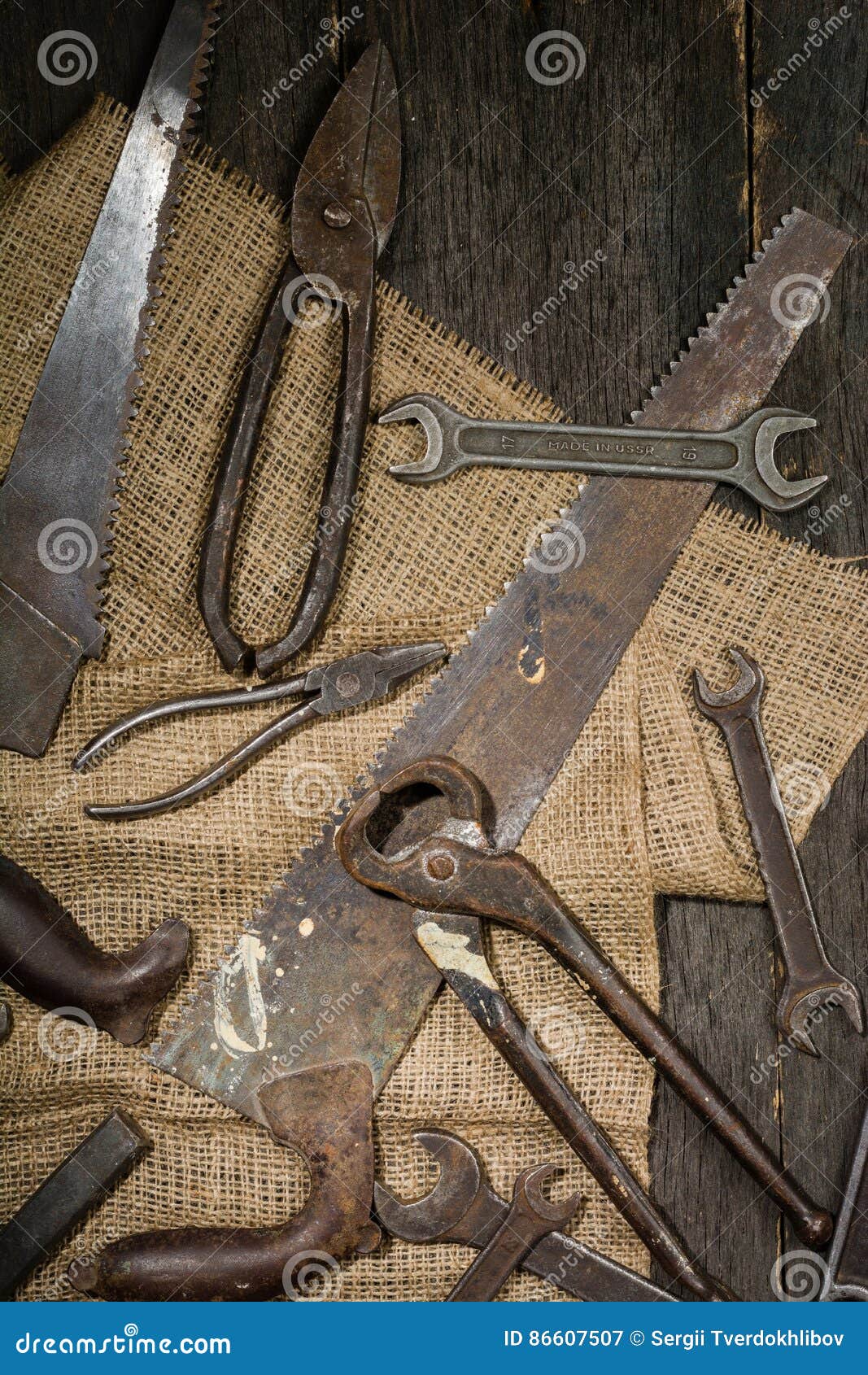 Many Old Rusty Tools Scattered on the Wooden Tstolu. View from Above ...