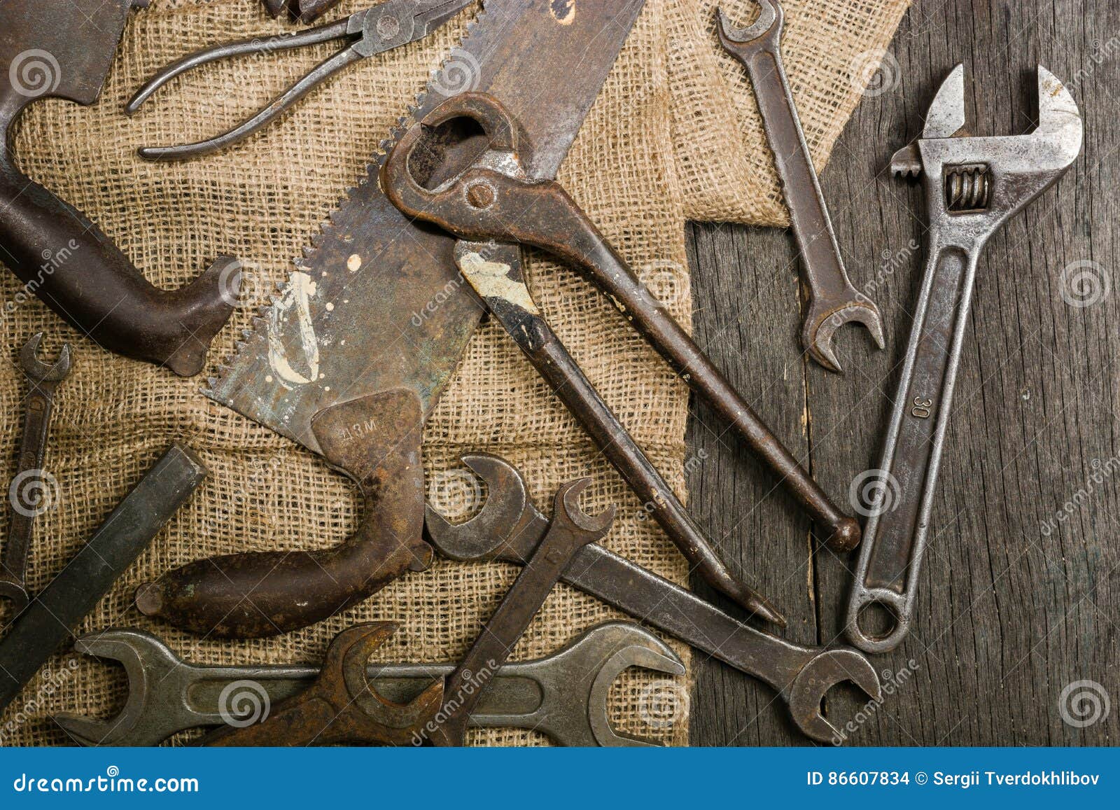 Many Old Rusty Tools Scattered on the Wooden Tstolu. View from Above ...