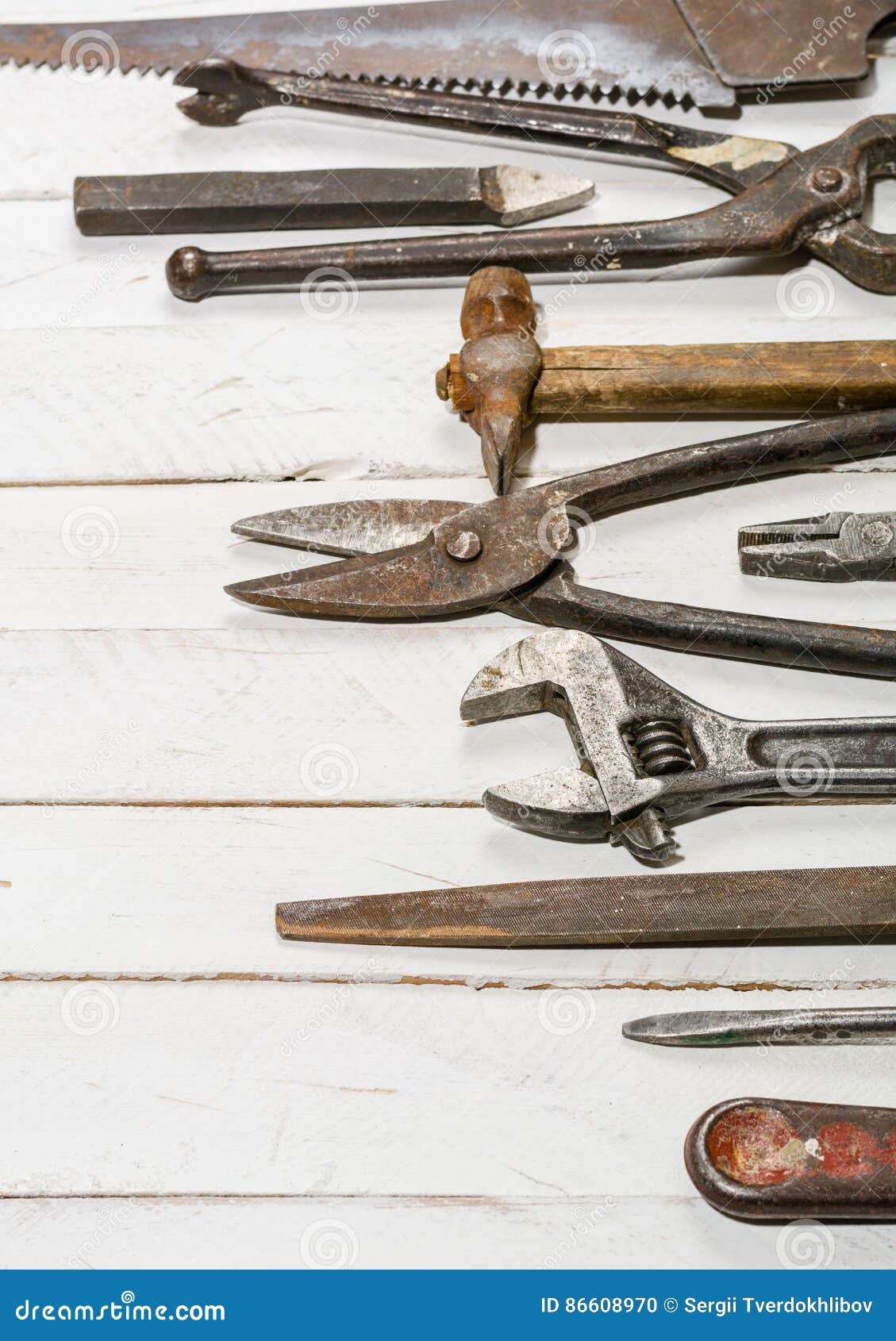 Many Old Rusty Tools Scattered on the Wooden Tstolu. View from Above ...