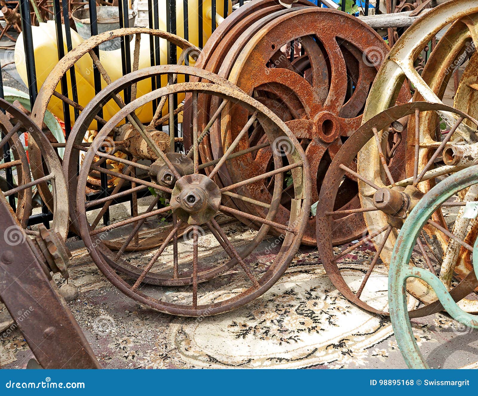 Old Rusty Wheels on Display Stock Photo - Image of wheels, damaged ...