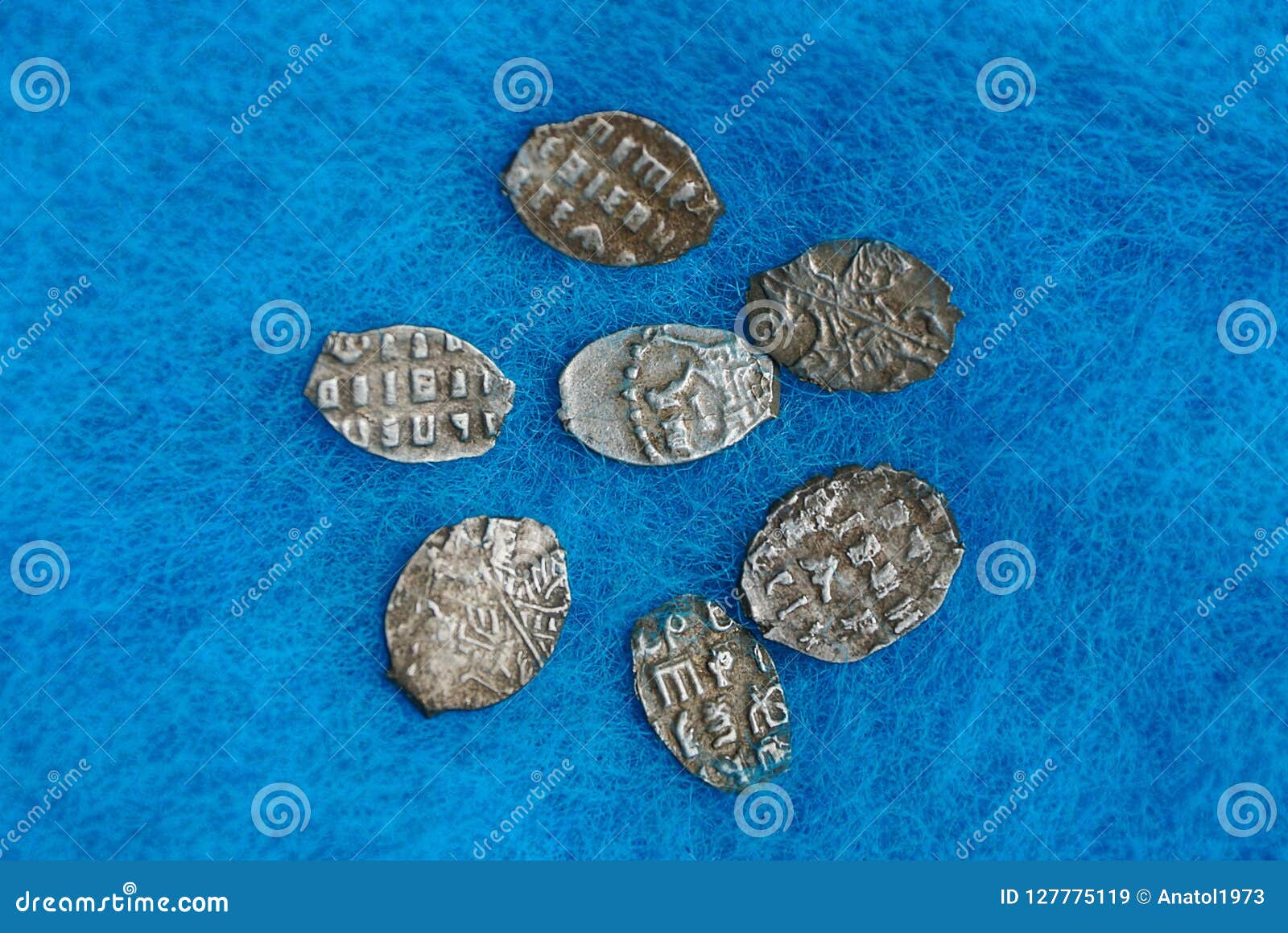 Old Small Silver Coins on Blue Wool Stock Image - Image of empire, gray ...