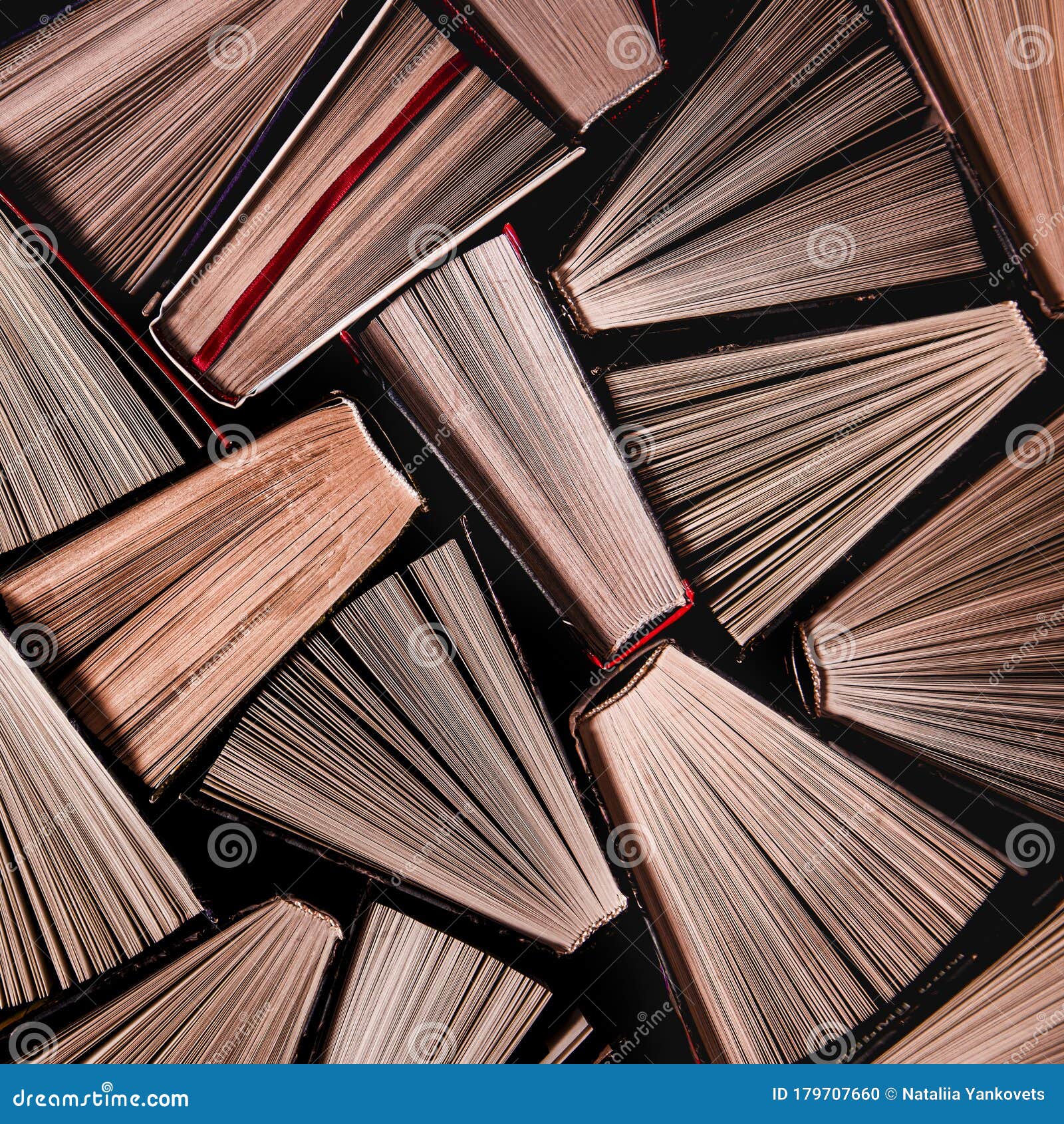 Many Open Old Multicolored Books Stand on the Bookshelf Stock Photo ...