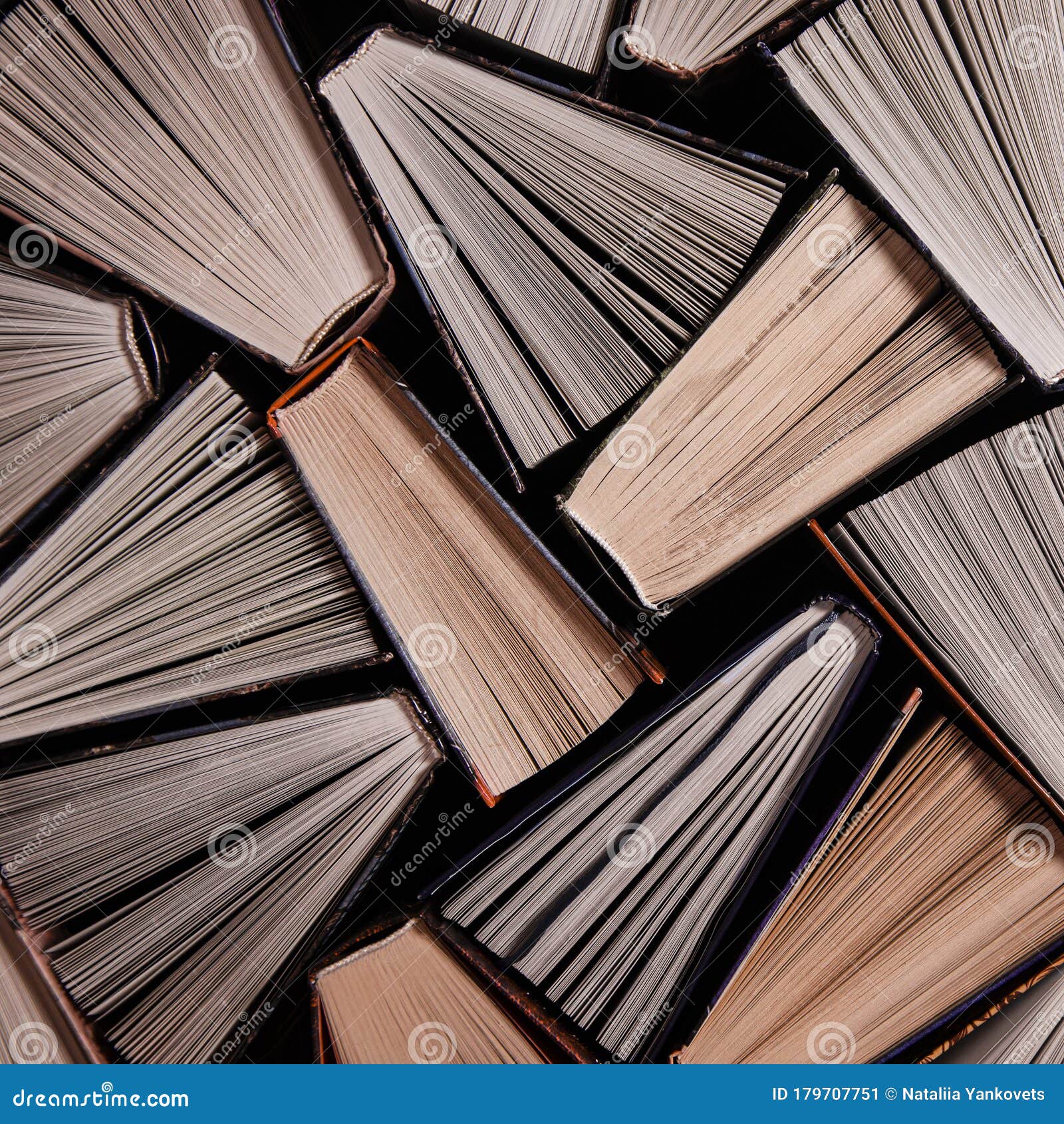 Many Open Old Multicolored Books Stand on the Bookshelf Stock Image ...