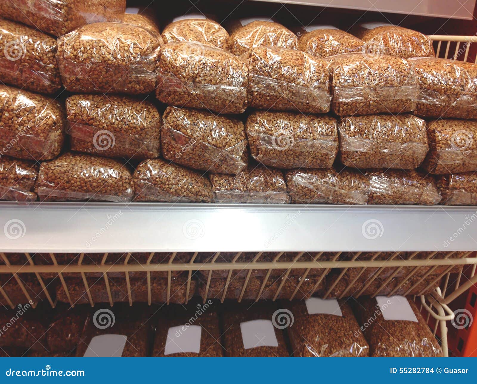 Many Packages of Buckwheat on the Shelf in Shop Stock Photo - Image of ...