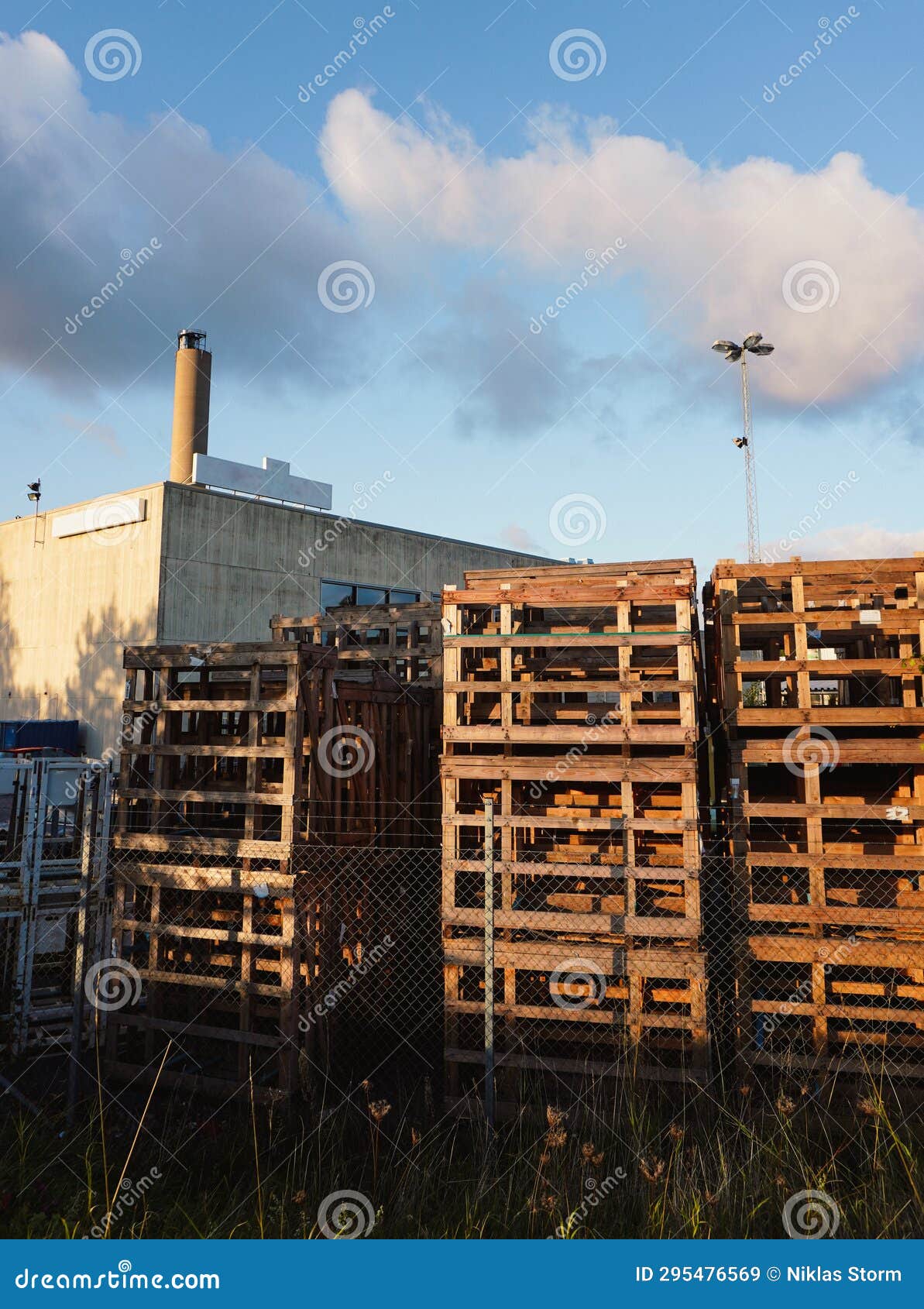 Many Pallets Stacked In Stock, Warehouse Pallets. Old Wooden Material ...