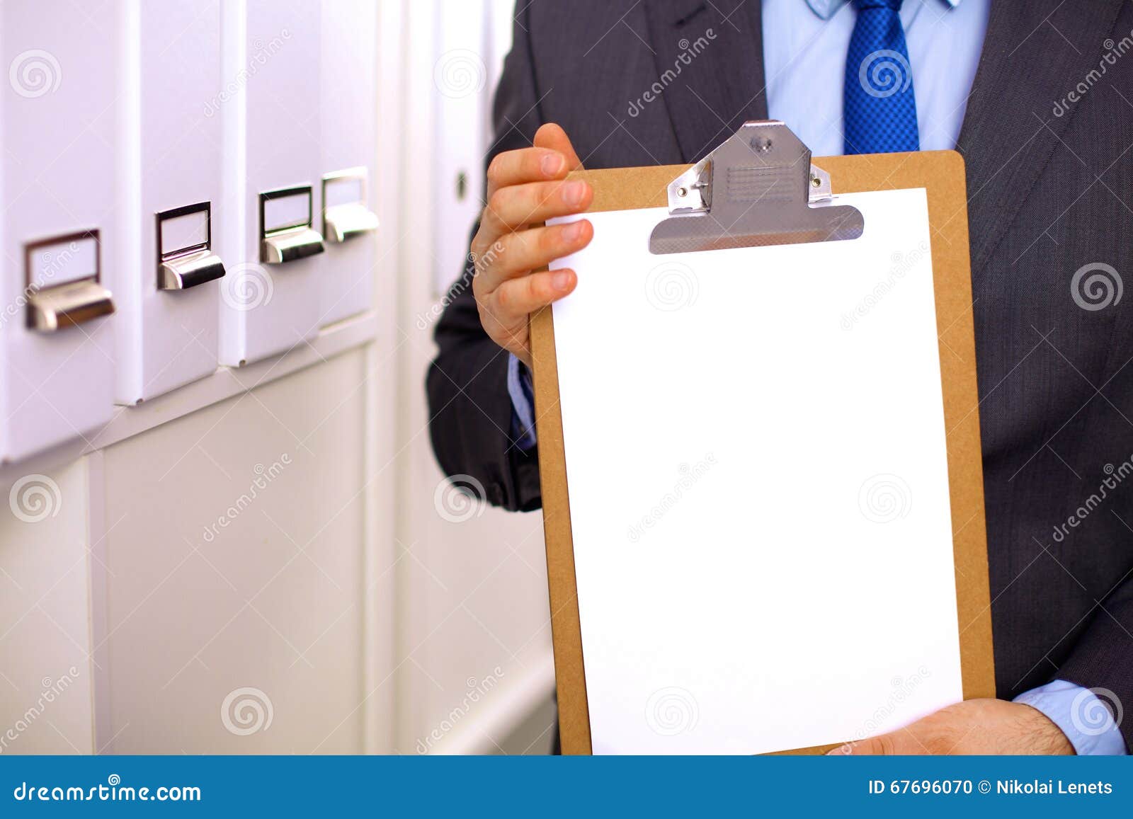 Many Papers Orderly Arranged in a File Shelves. and Some are Still on ...