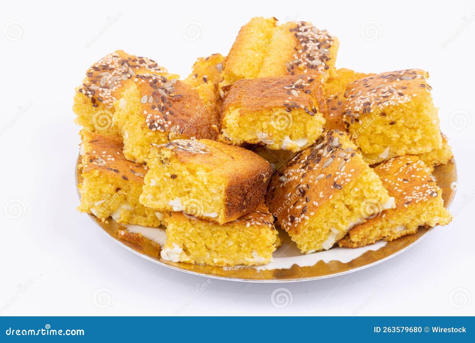 Many Pieces of Cornbread Served on a Plate Isolated on an Empty White ...