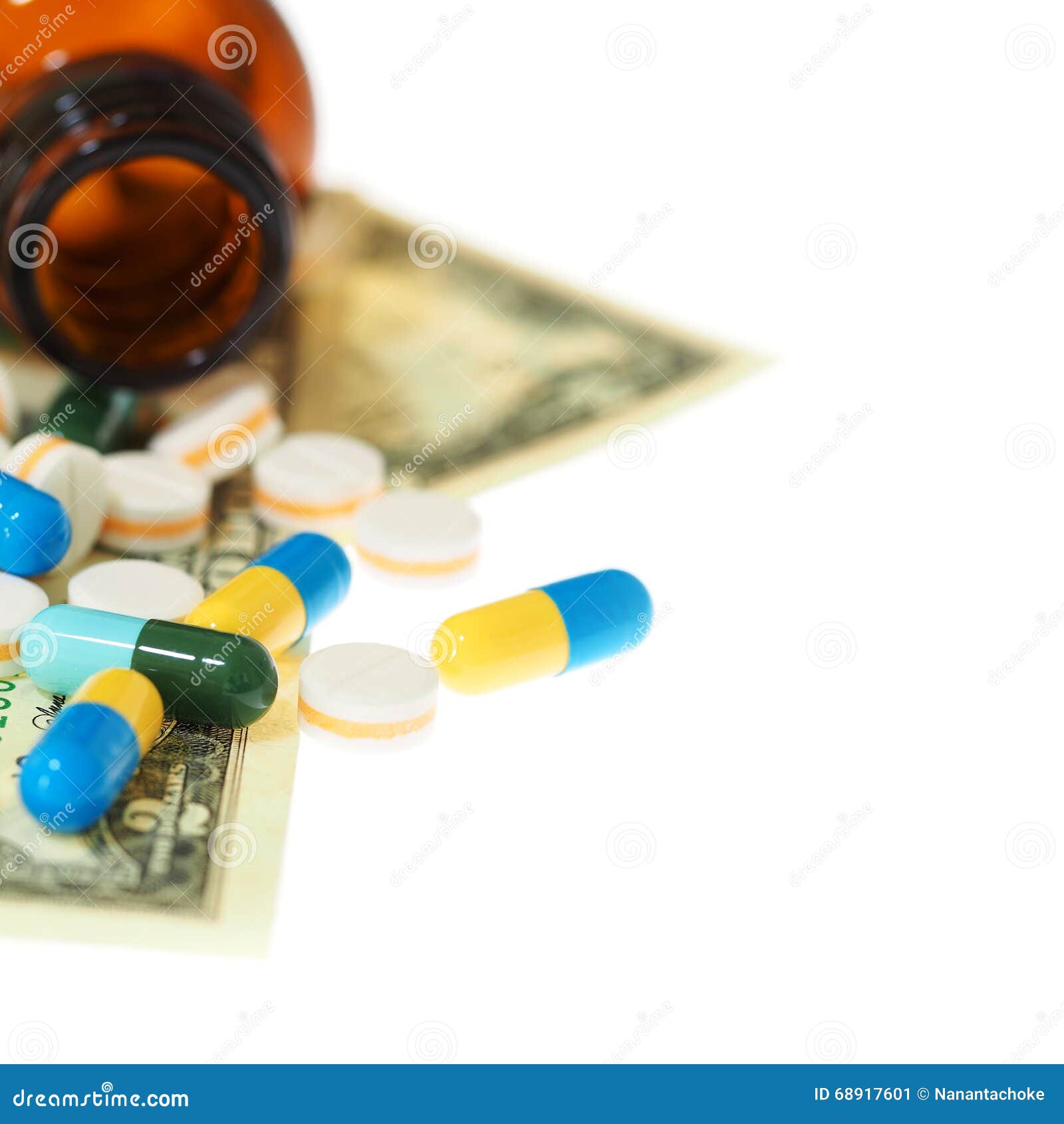 Many Pills and Tablets on Dollar Bill Isolated on White Background ...