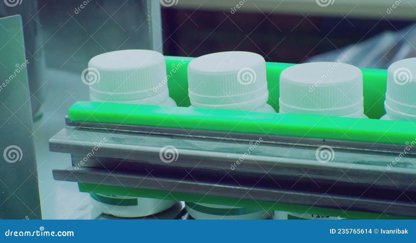 Many Plastic Medicine Vials are Moving through the Sorting Drum of the ...