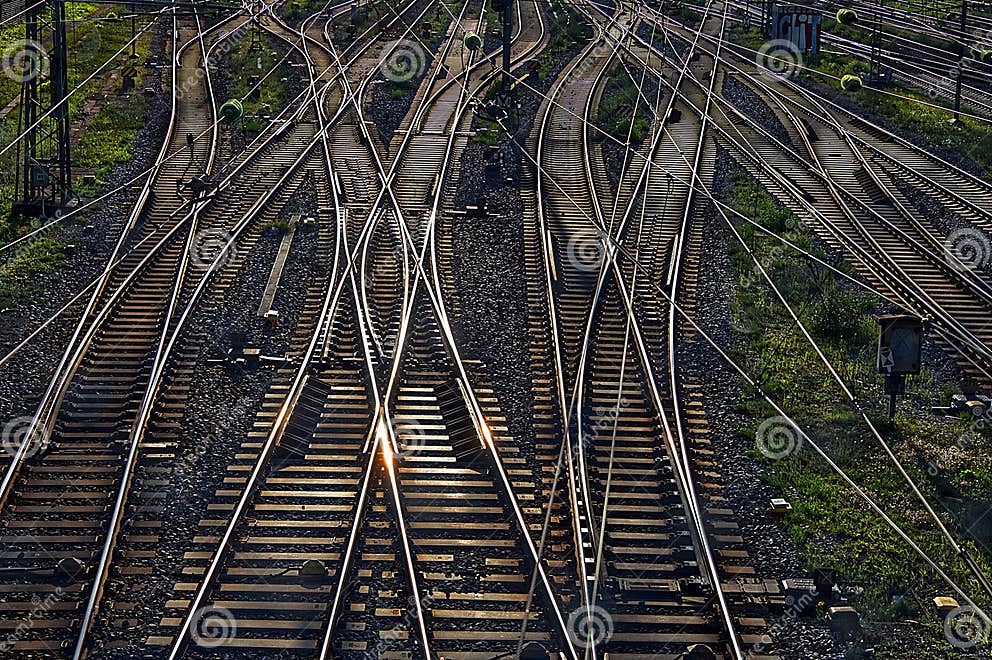 Many Railroad Tracks with Interchanges and Electric Cables Stock Image ...