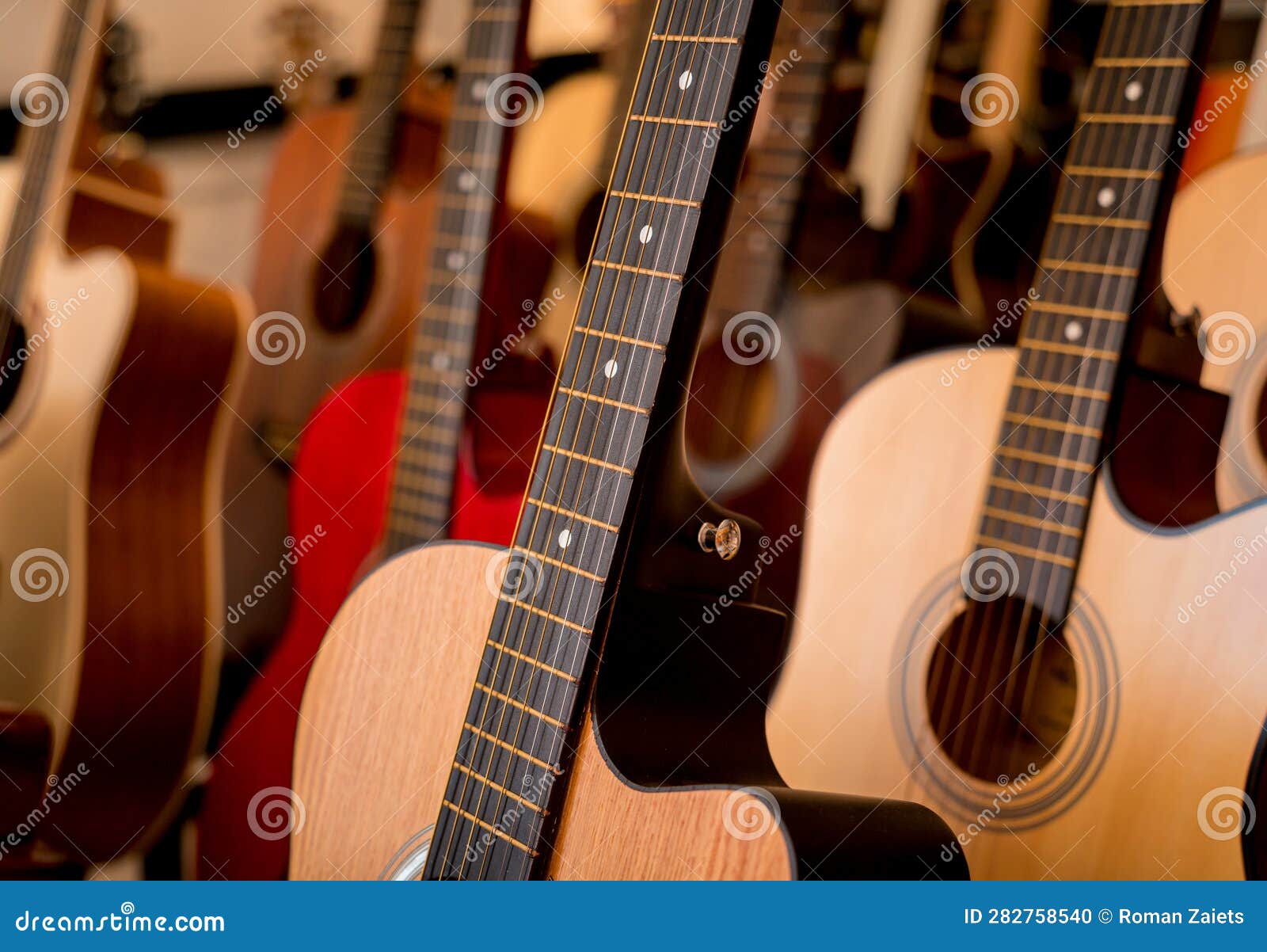 Many Rows of Classical Guitars in the Music Shop Stock Photo - Image of ...