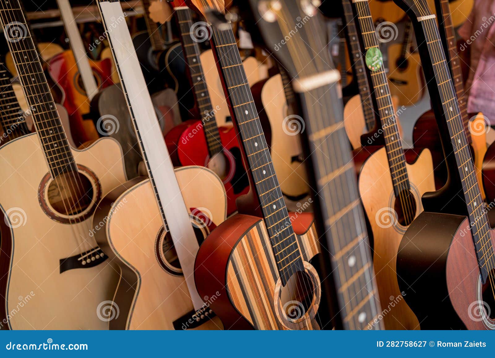 Many Rows of Classical Guitars in the Music Shop Stock Image - Image of ...