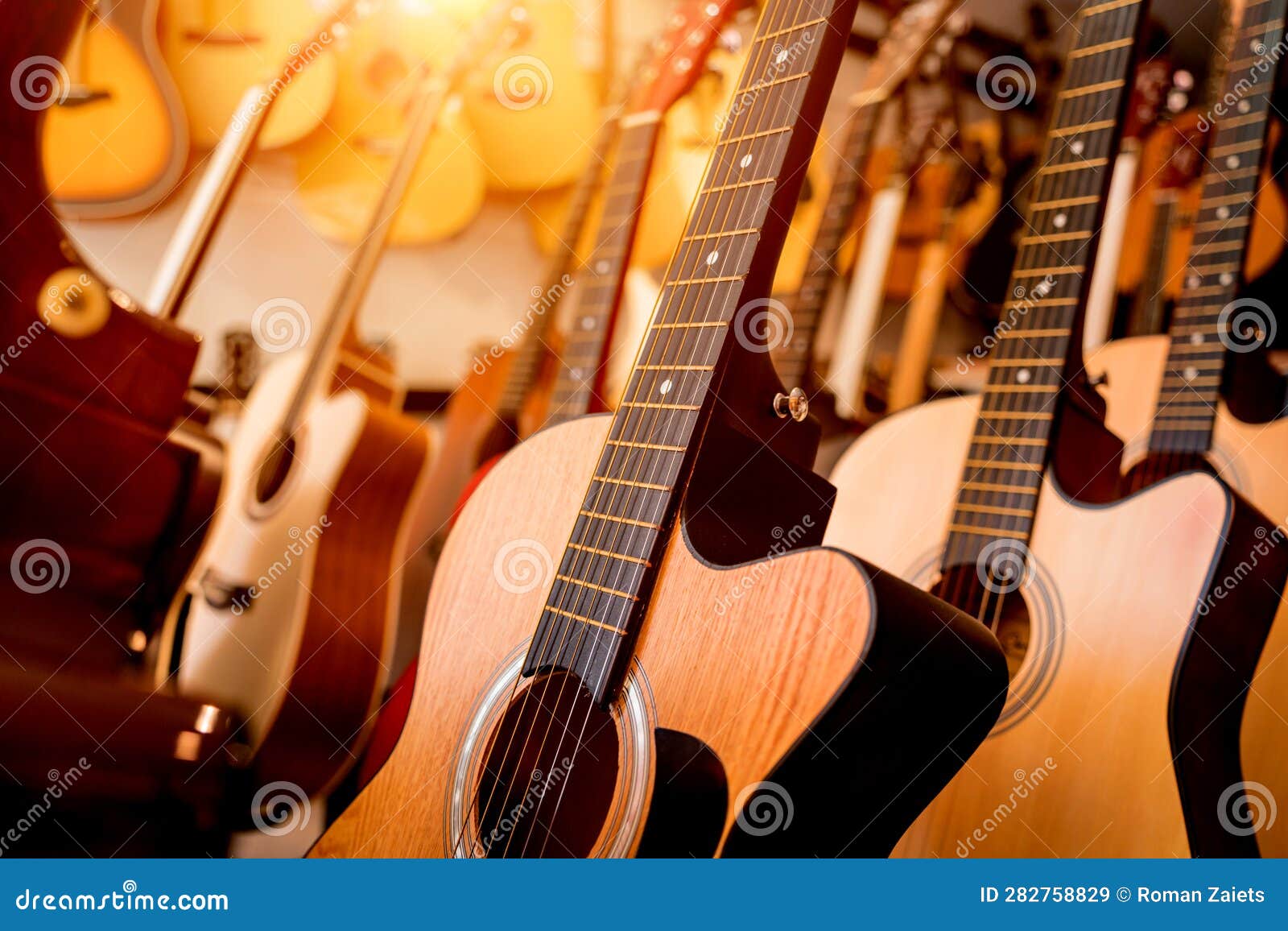 Many Rows of Classical Guitars in the Music Shop Stock Image - Image of ...