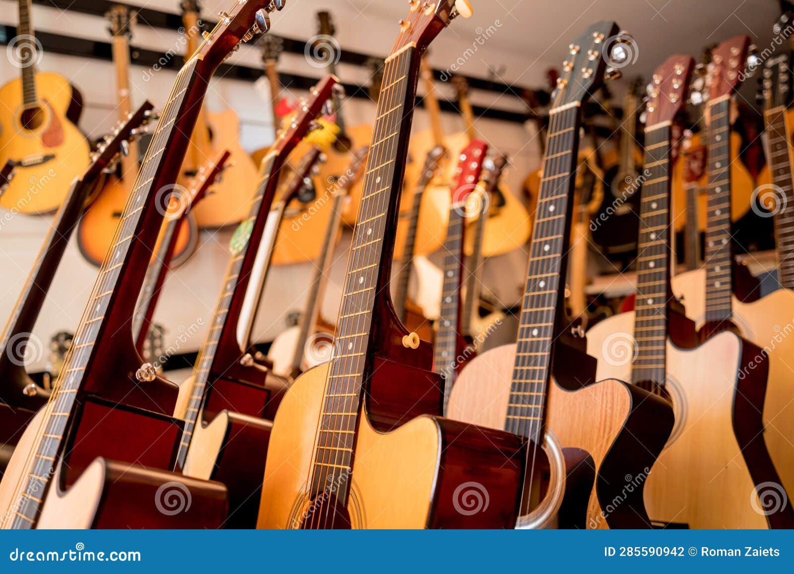 Many Rows of Classical Guitars in the Music Shop Stock Photo - Image of ...