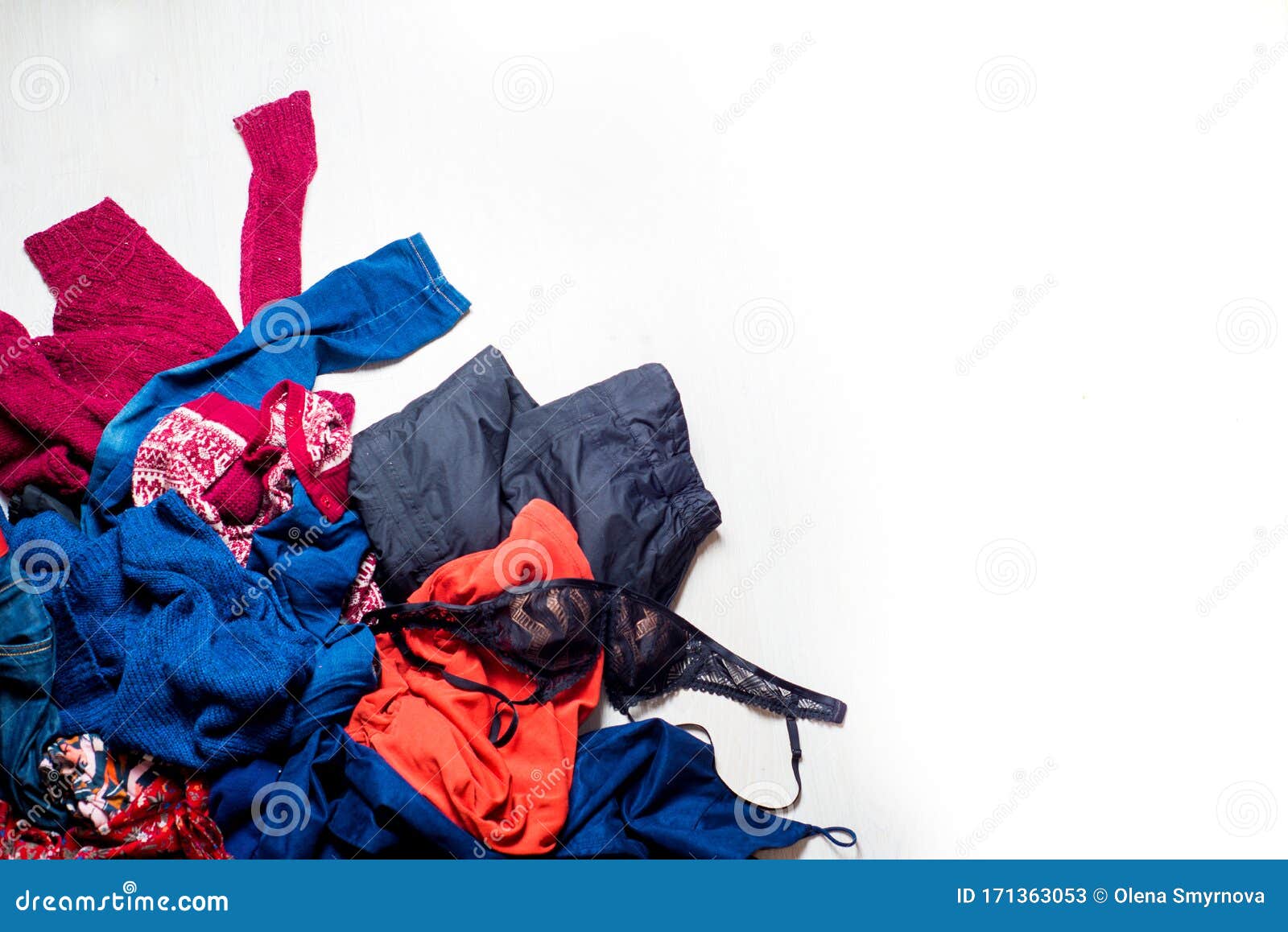 Many Scattered Clothes on a White Background. Stock Image - Image of ...