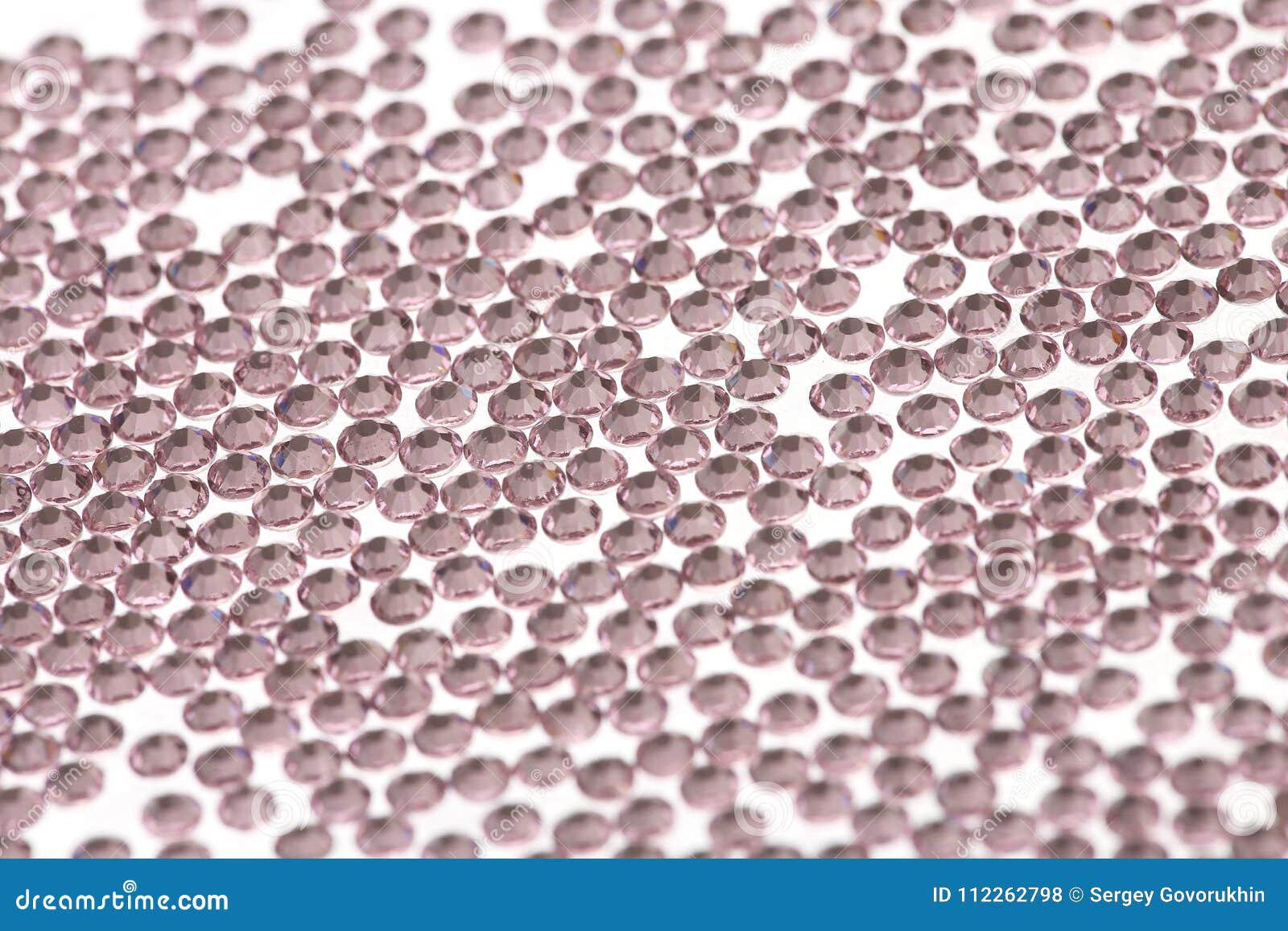 Many Scattered Rhinestones. on a White Background Stock Photo - Image ...