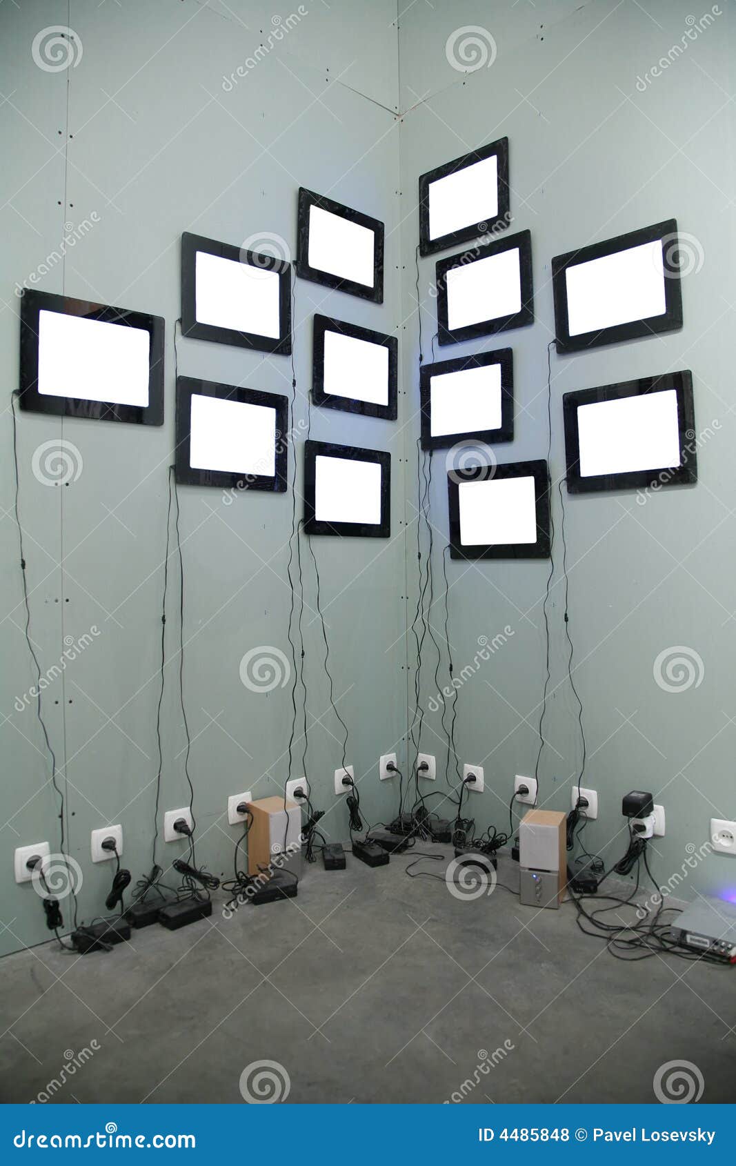 Many screens on wall stock photo. Image of photograph - 4485848