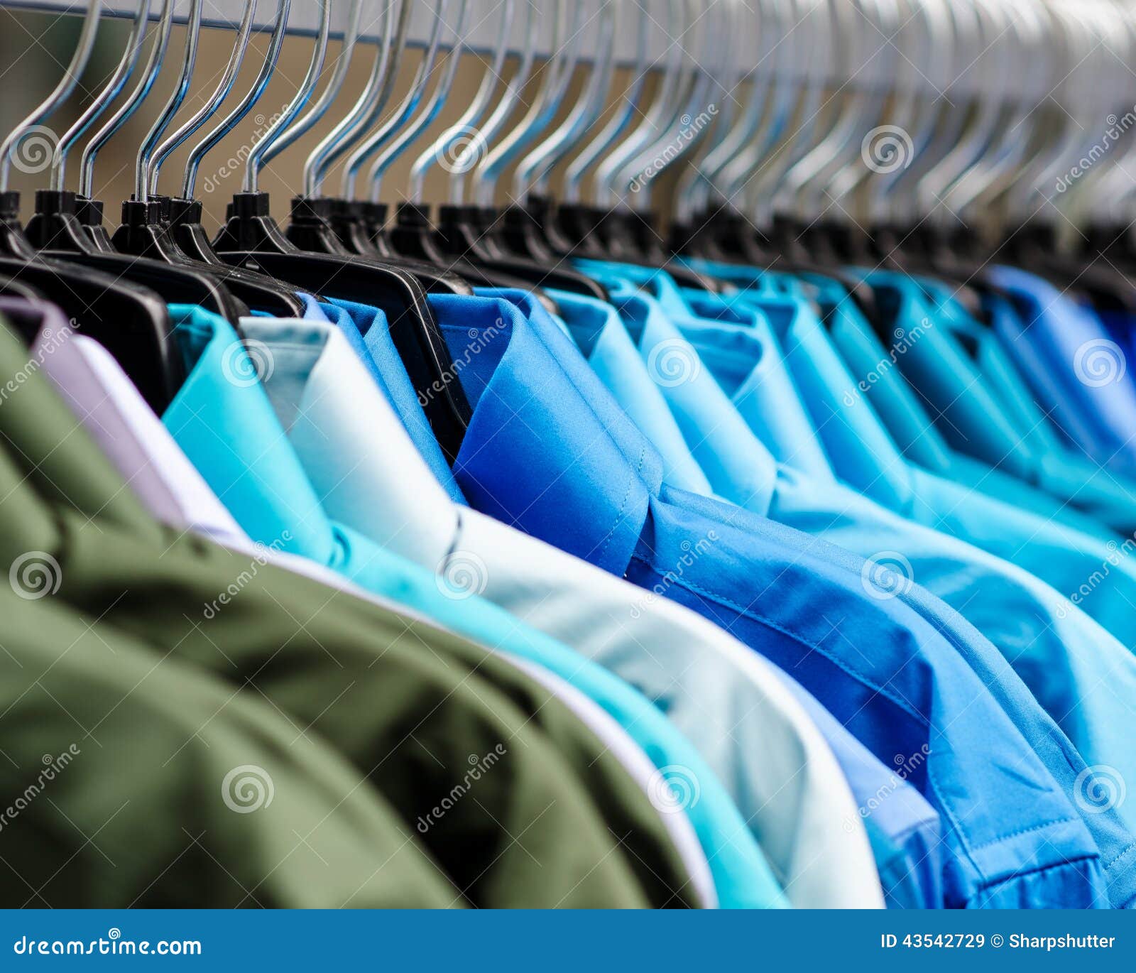 Many Shirts Hanging in Color Stock Image - Image of hanger, deal: 43542729