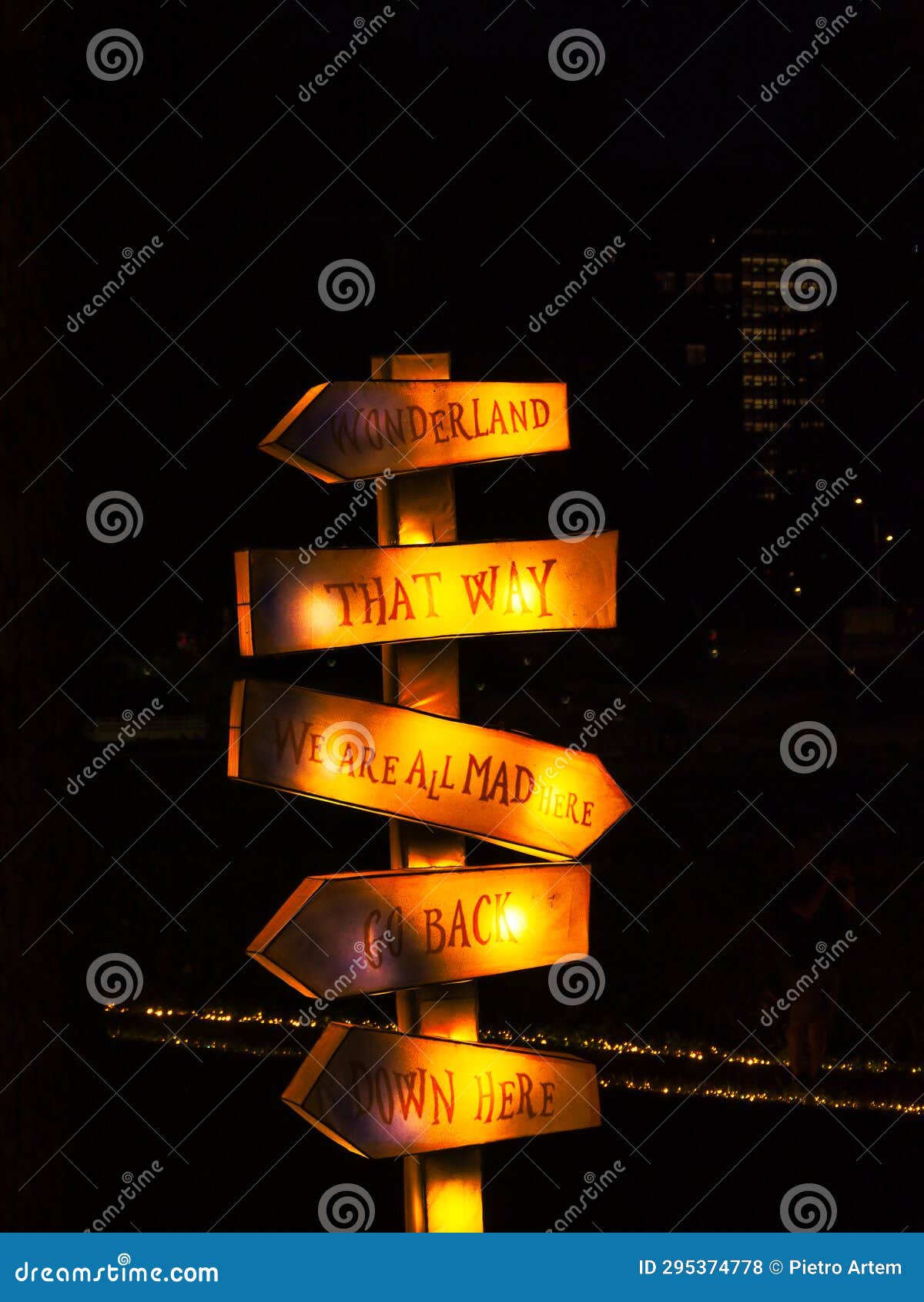 Many Signs in Wonderland at Night Stock Photo - Image of card, design ...