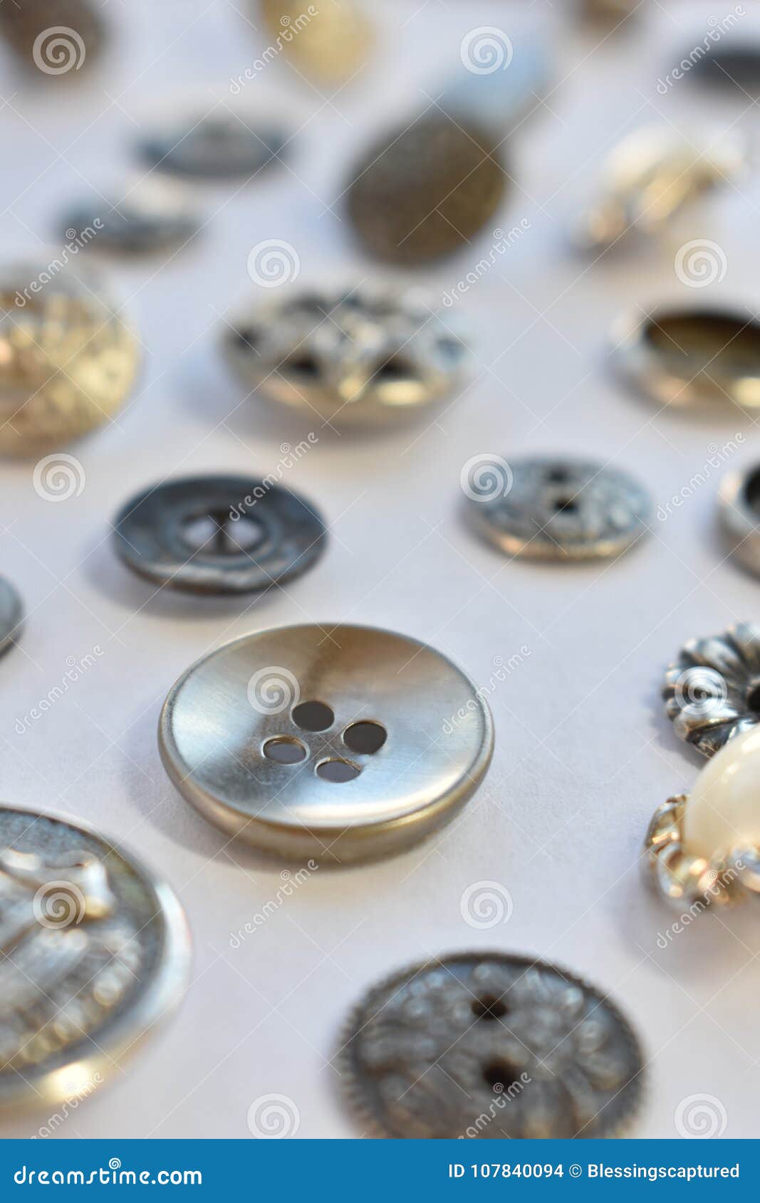 Silver Sewing Buttons on White Stock Photo - Image of steel, equipment ...