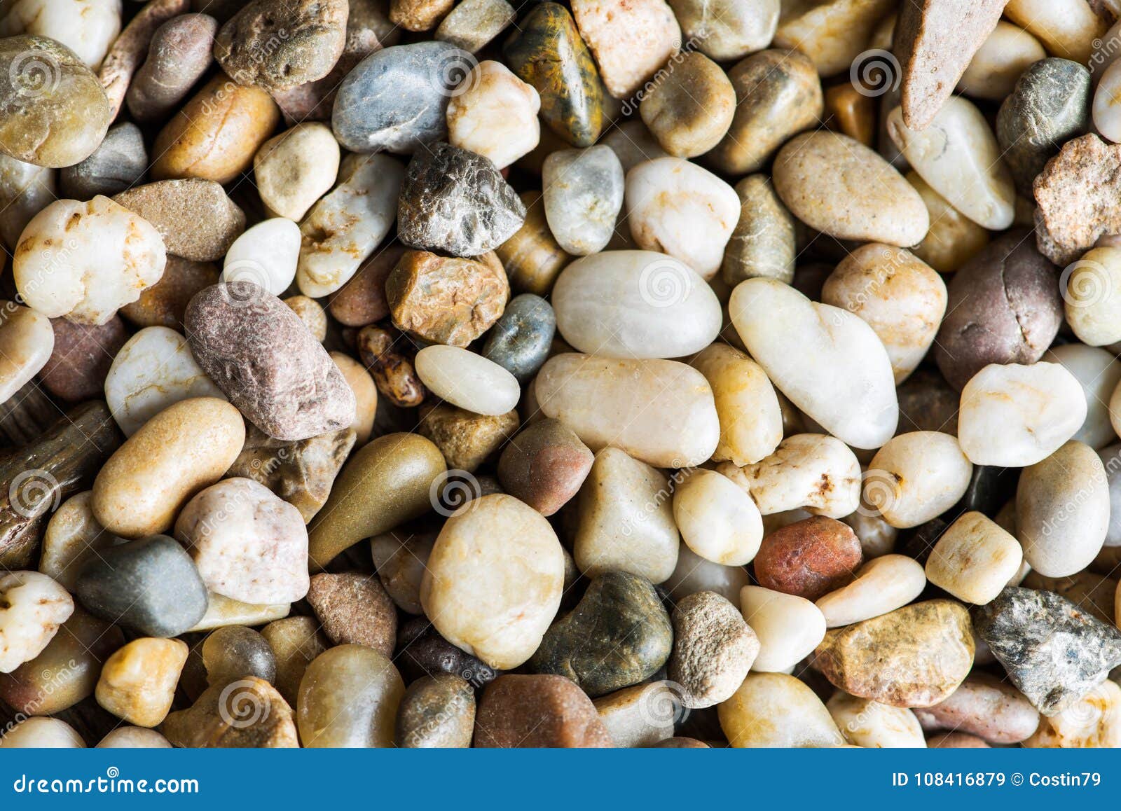 Many small stones forming stock image. Image of nature - 108416879