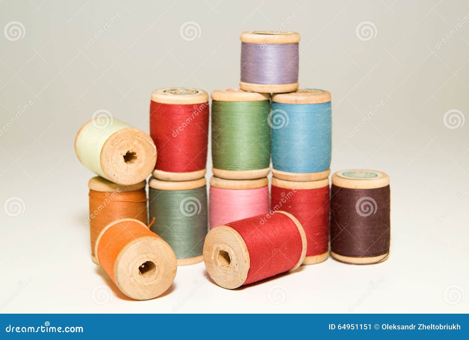 Many Spools of Thread of Different Colors on a White Stock Image ...