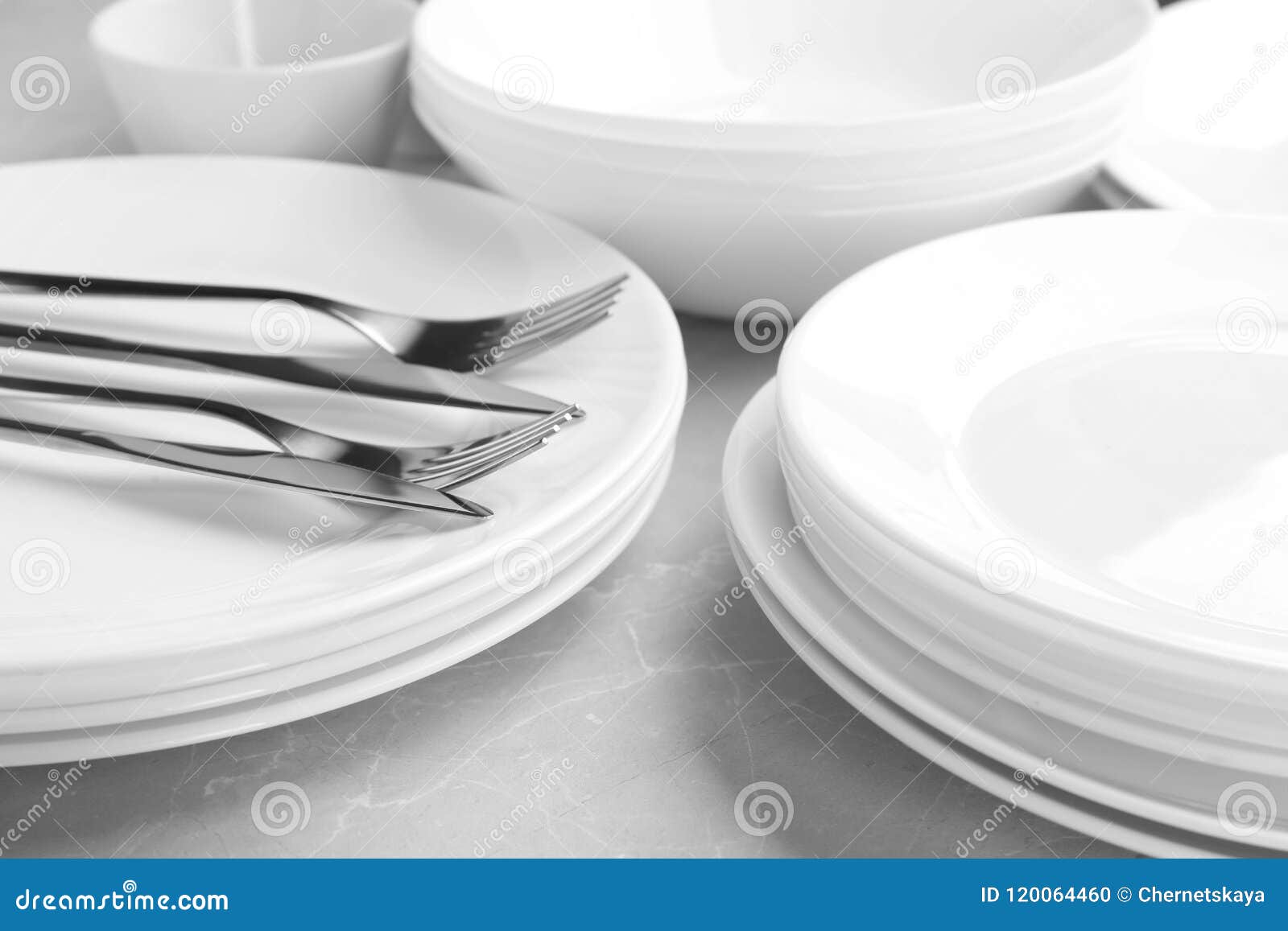 Many Stacked Plates with Cutlery Stock Photo - Image of kitchen, clean ...