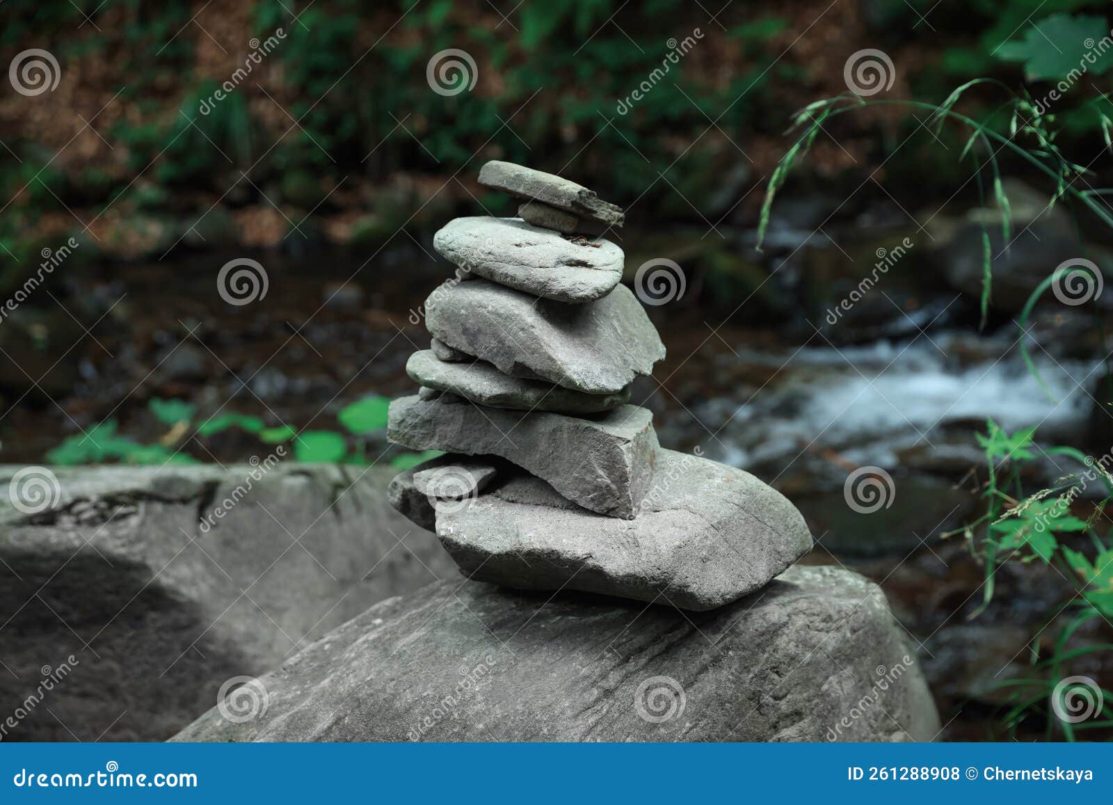 Many Stacked Stones Near Stream in Forest Stock Photo - Image of spring ...