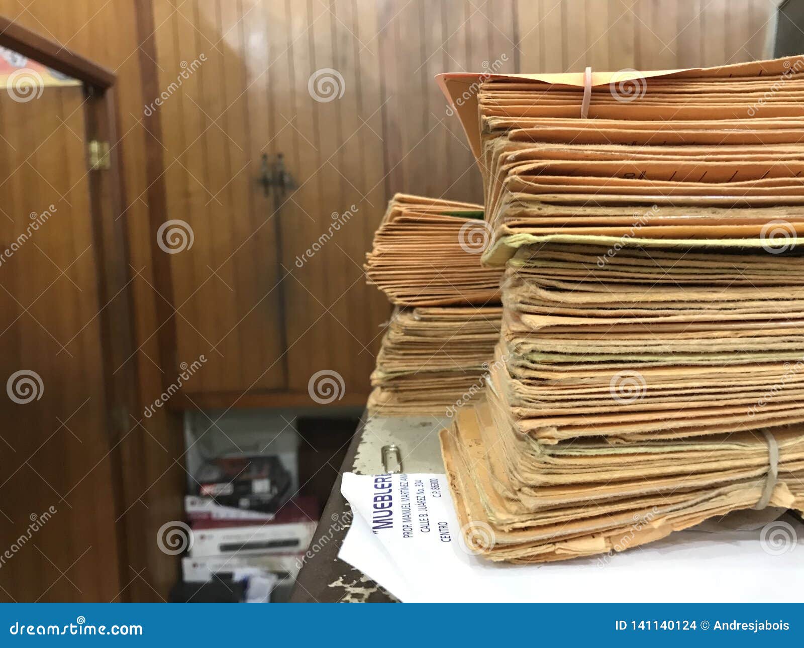 Many Stacked Yellow Envelopes Separated into Packages with Rubber Bands ...