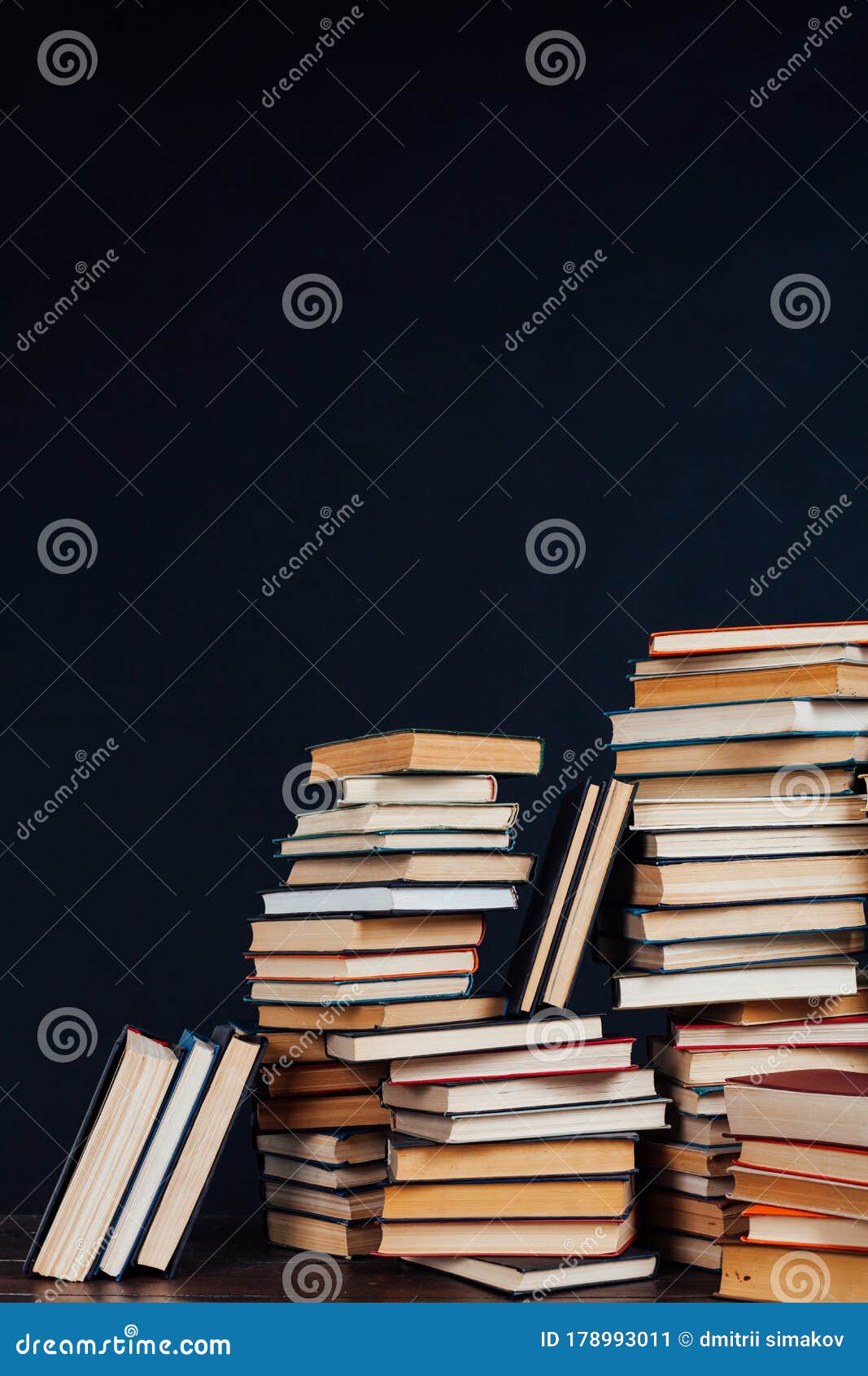 Many Stacks of Educational Books To Teach in the Library on a Black ...
