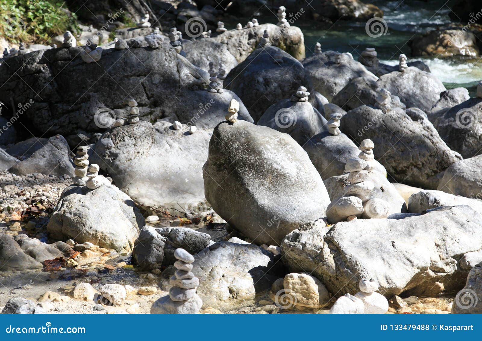 Many Stone Piles Near a River Stock Photo - Image of stacked, tower ...