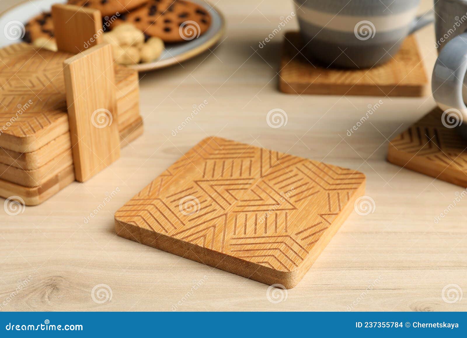 Many Stylish Wooden Cup Coasters on Table Stock Photo - Image of ...