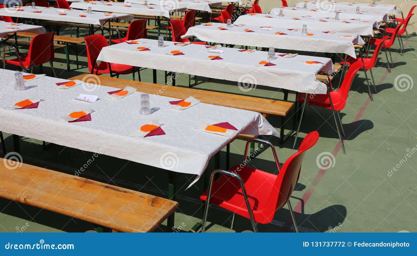 Tables Set for a Community Lunch with Many Guests Stock Photo - Image ...