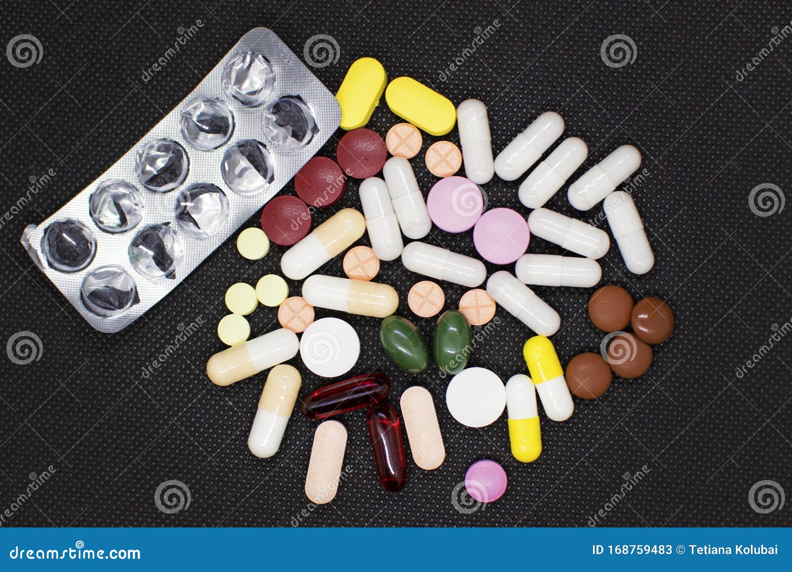 Many Tablets of Different Colors and Shapes and an Empty Blister from ...
