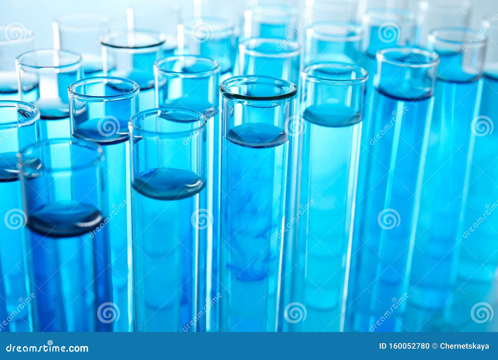 Many Test Tubes with Blue Liquid Stock Photo - Image of glassware ...