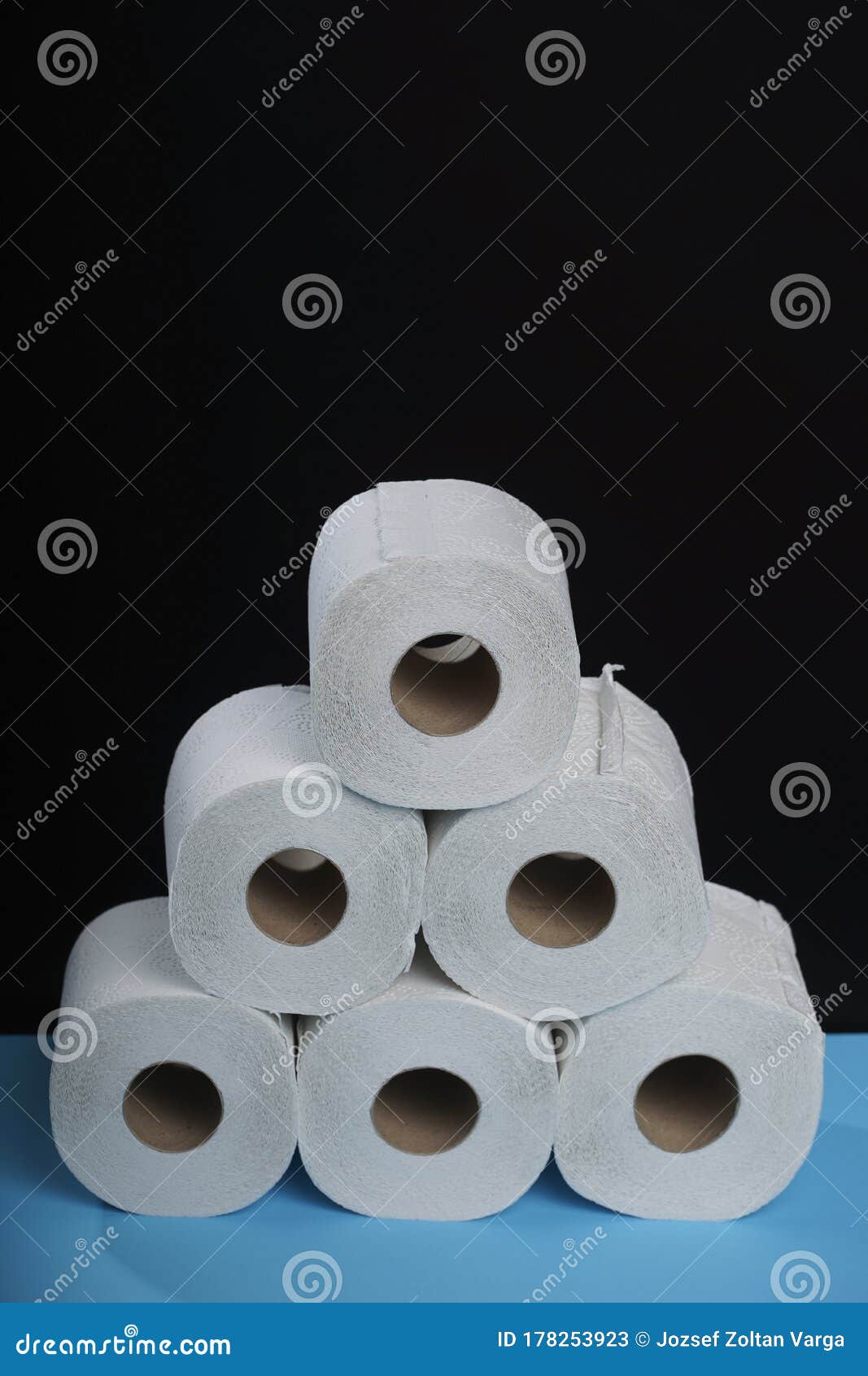 Many Toilet Paper Rolls Stacked In Pyramid Shape Soft Hygienic Paper