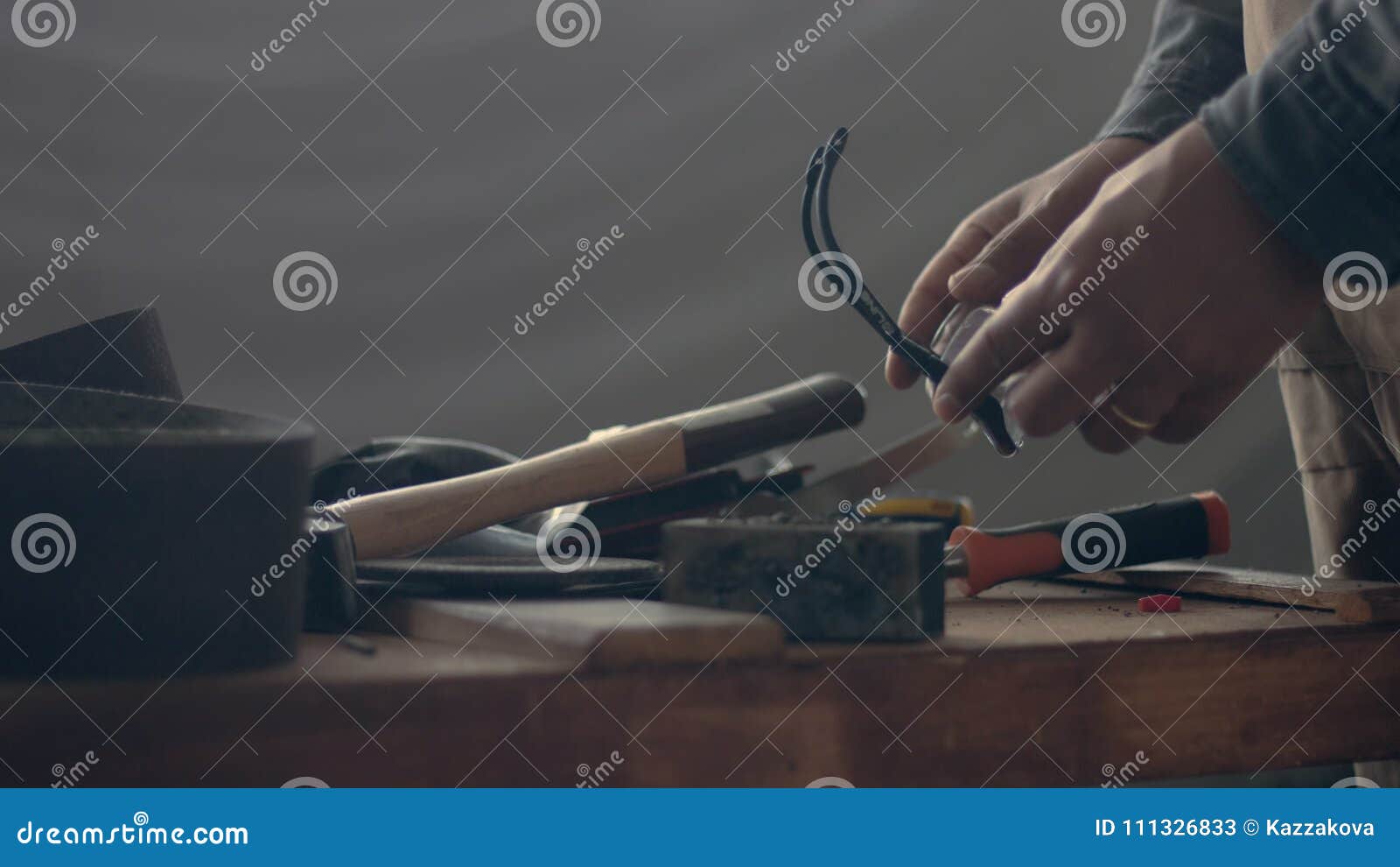 Many Tools on the Worker Table and His Hand Choosing One of Tool Stock ...