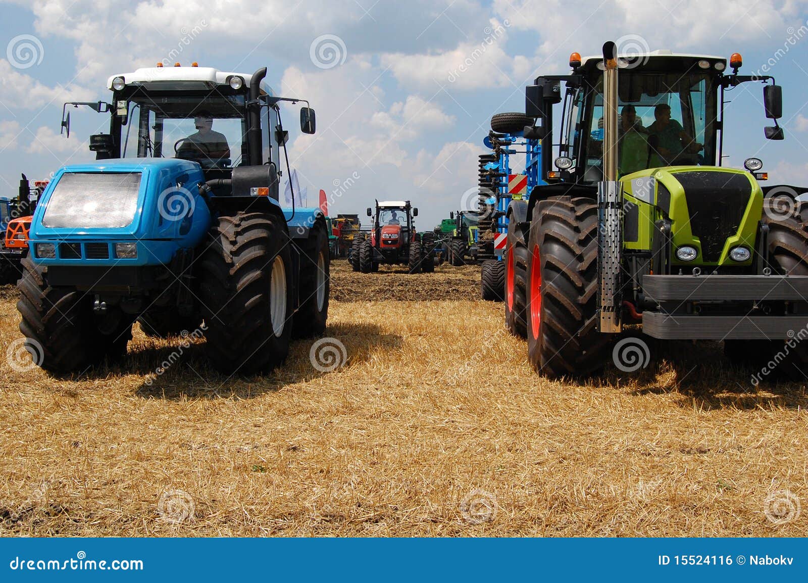 Many tractors on field stock photo. Image of wheels, park - 15524116