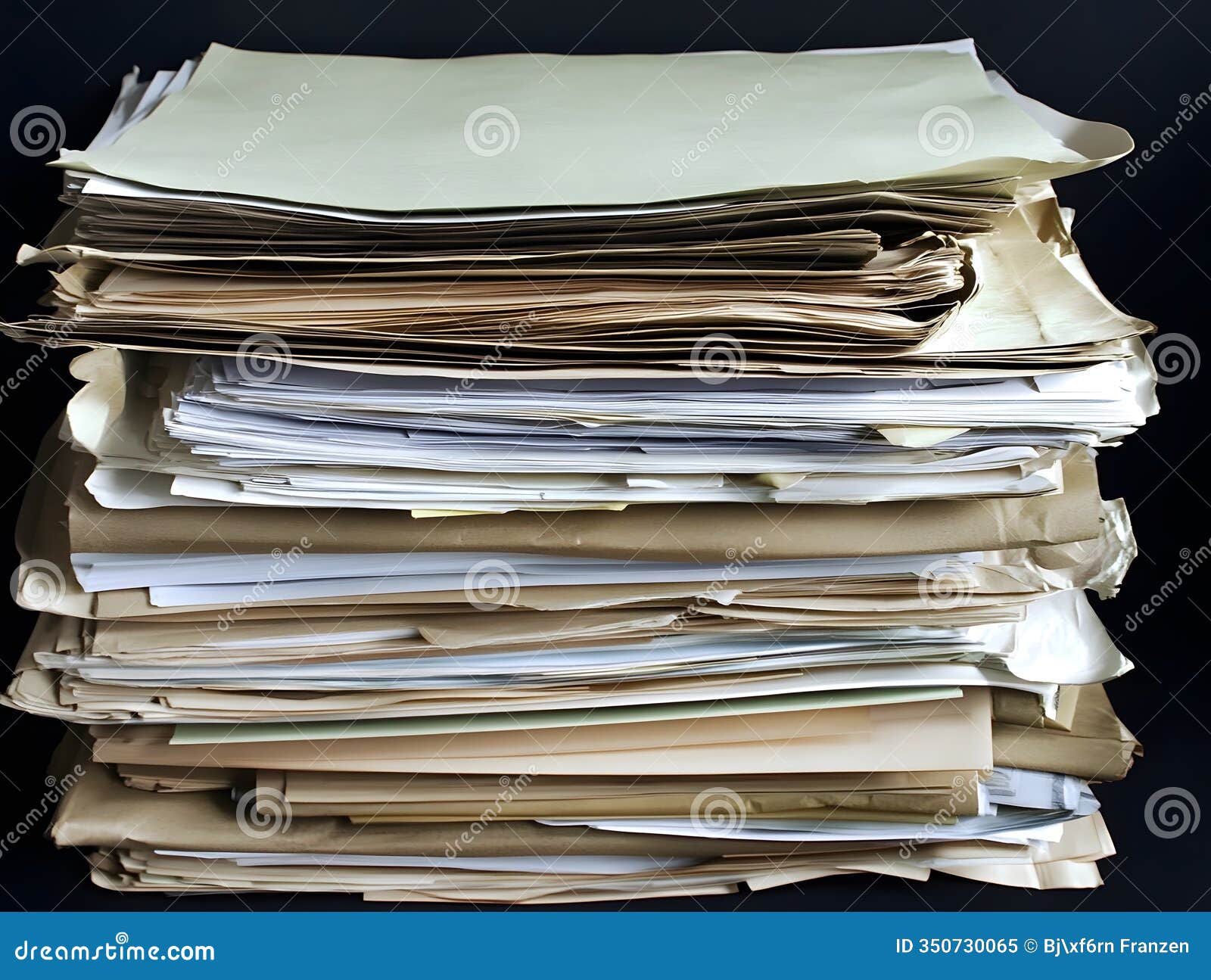 A Stack of Paper Documents. Office Business Paperwork Mess on a Desk ...
